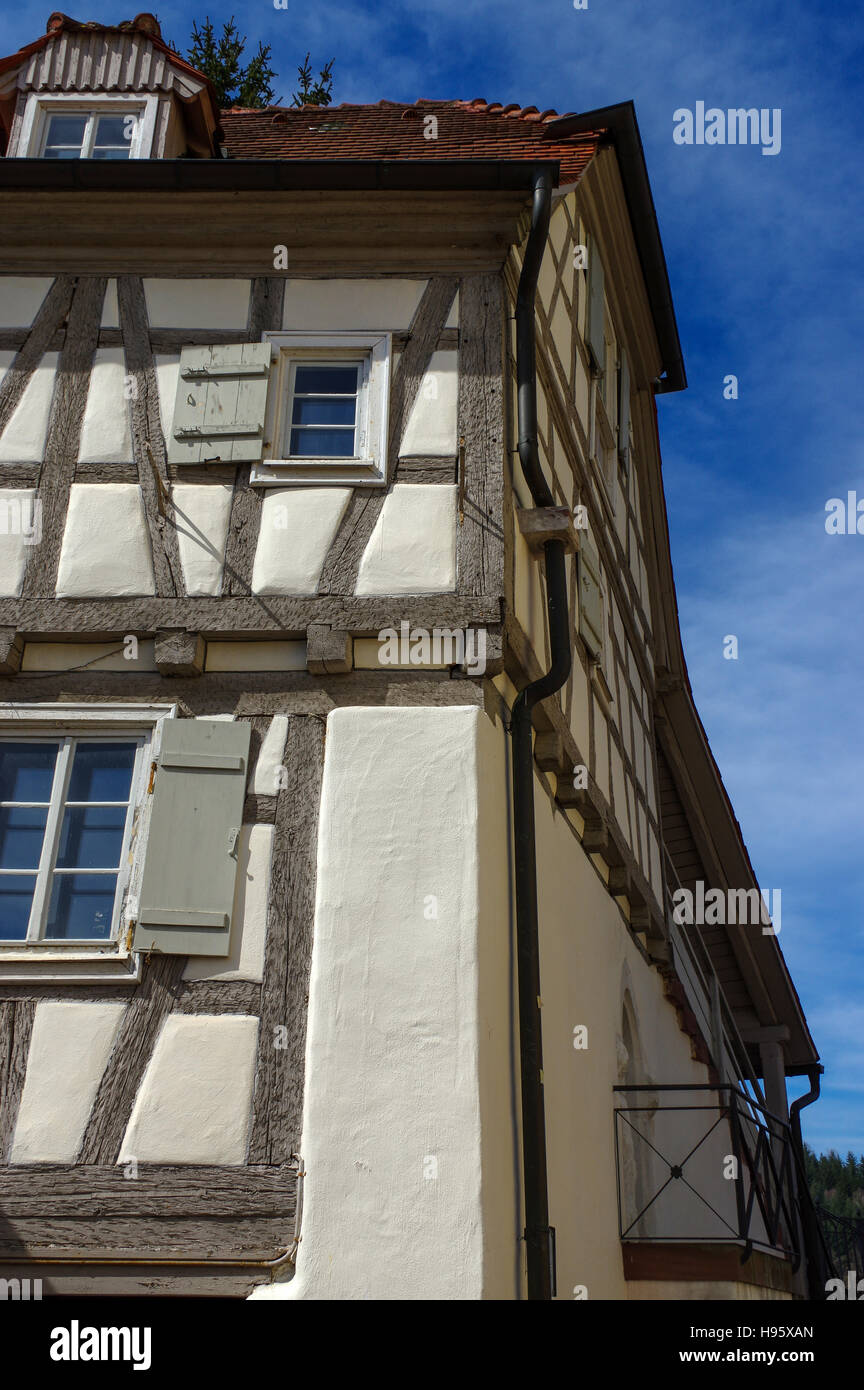 Residential tudor style house , with blue sky in background. Castle ...