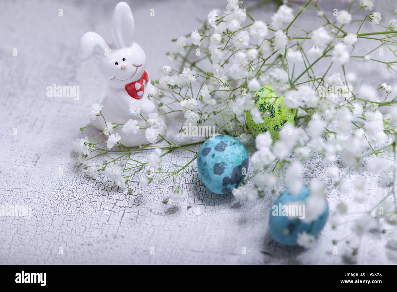 Easter symbols including flowers eggs and bunny Stock Photo - Alamy