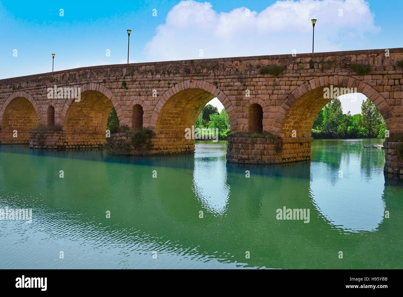 Roman bridge over guadiana river in merida hi-res stock photography and ...