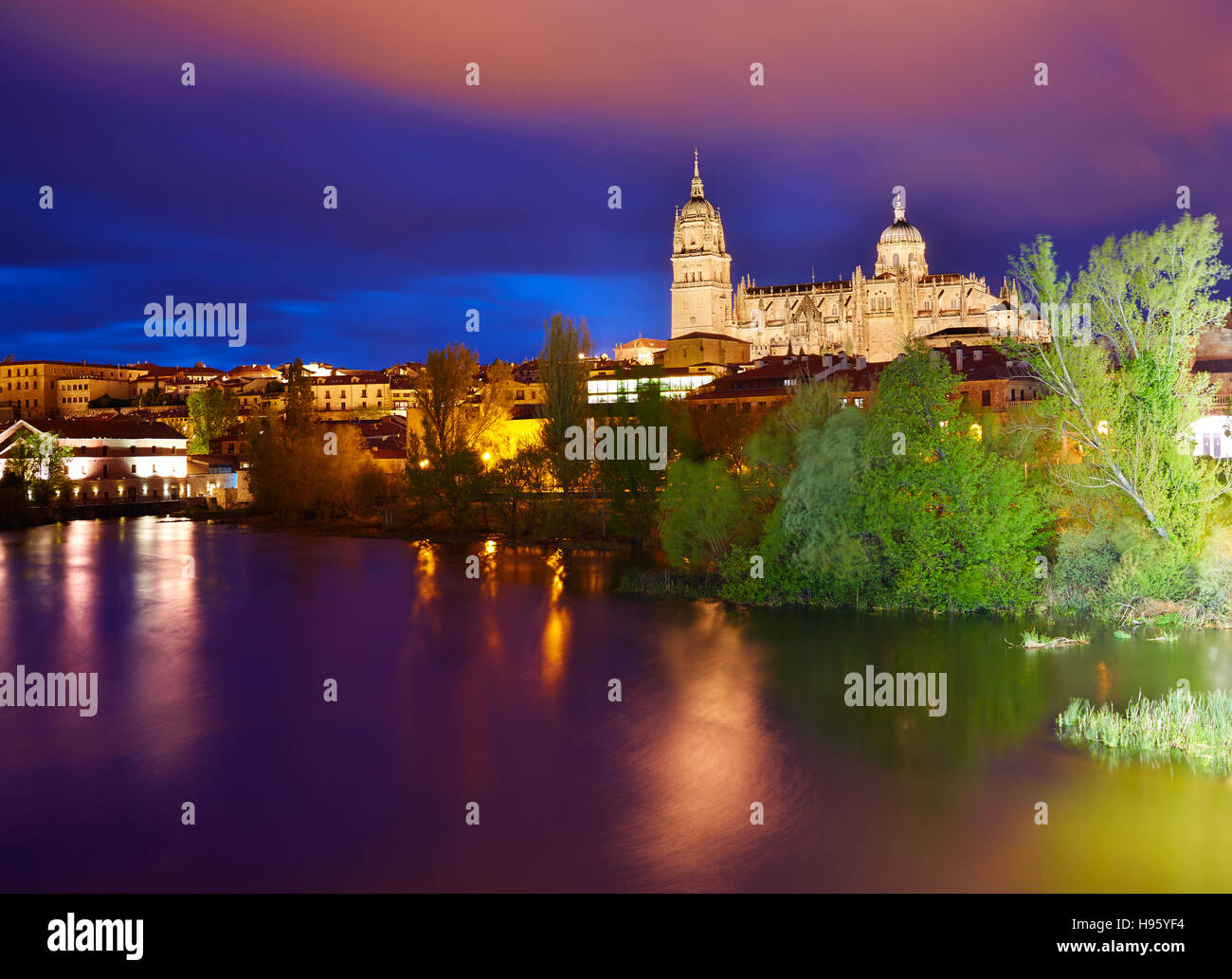 Salamanca skyline sunset with Tormes river in Spain Stock Photo - Alamy