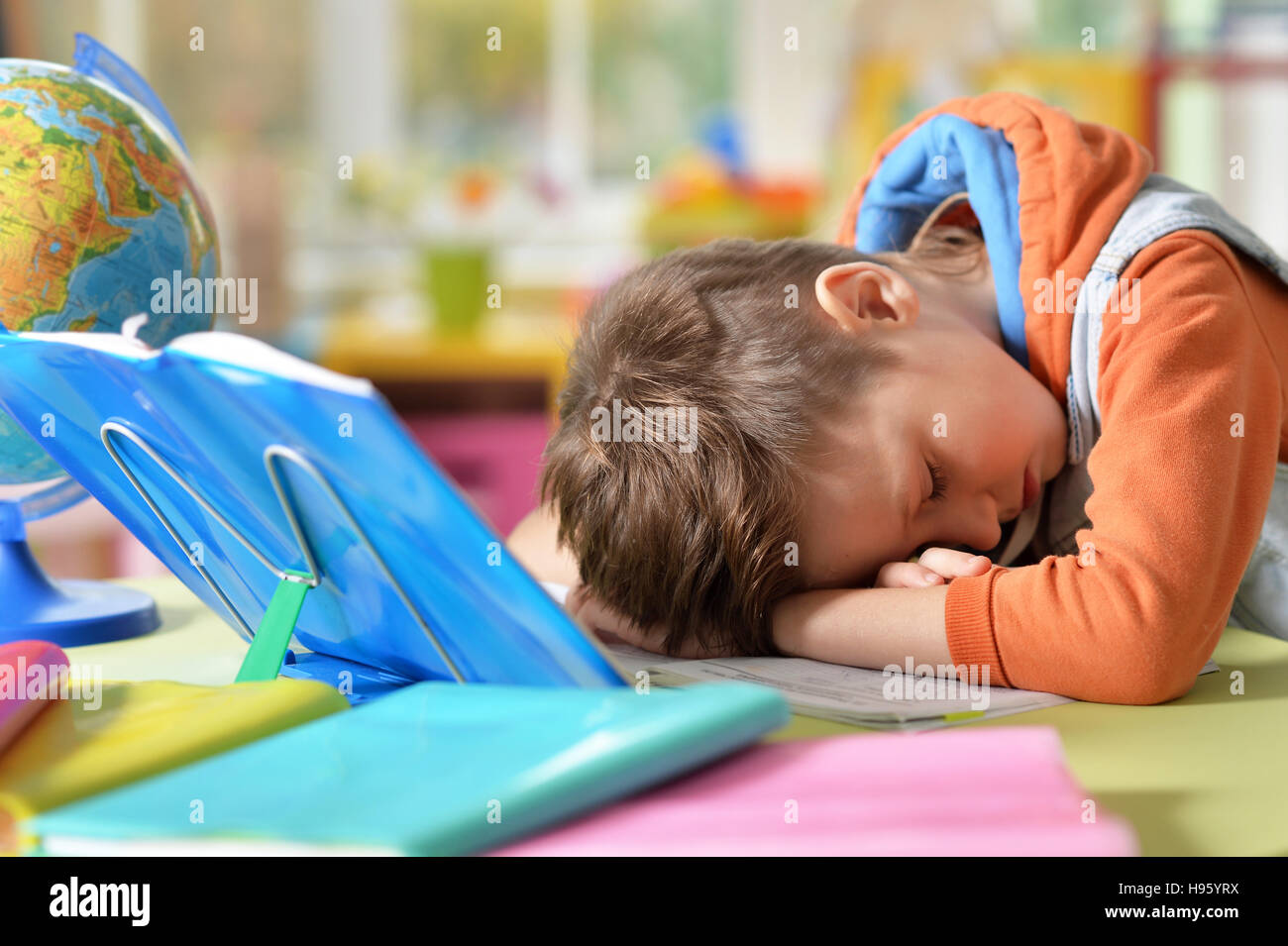 Tired little boy Stock Photo - Alamy