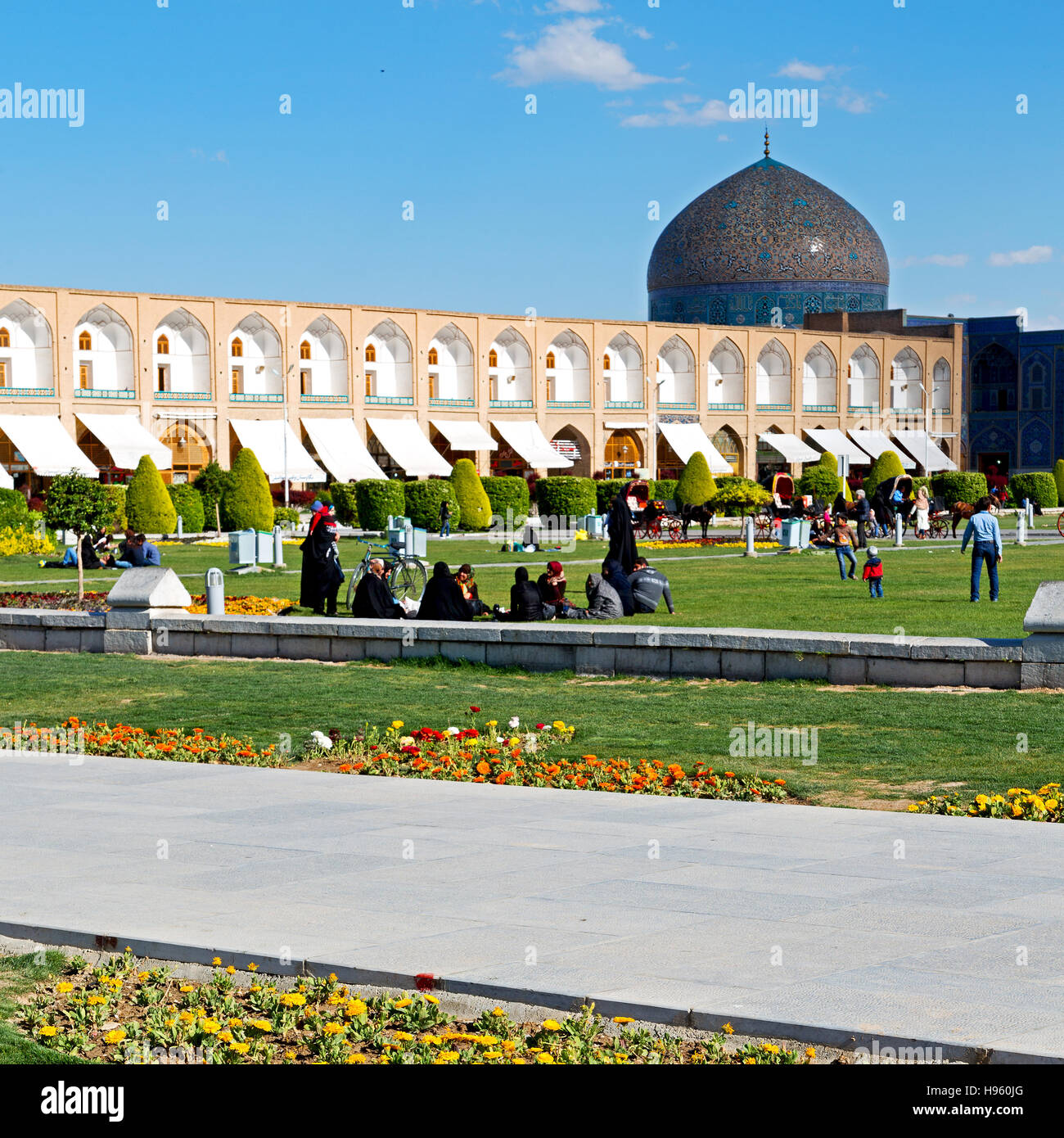 blur in iran the old square of isfahan prople garden tree heritage ...