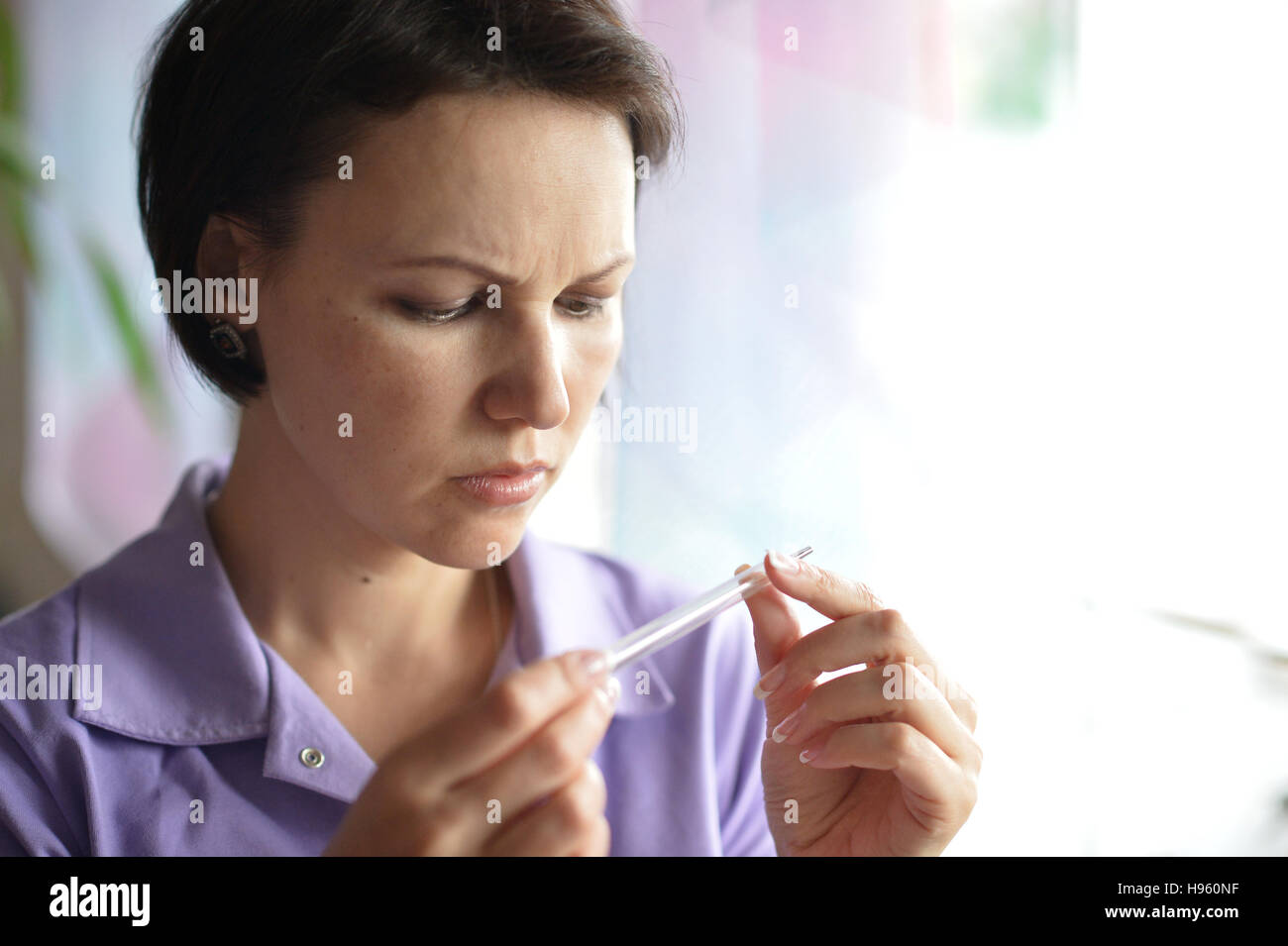 Young woman feels sickness Stock Photo - Alamy