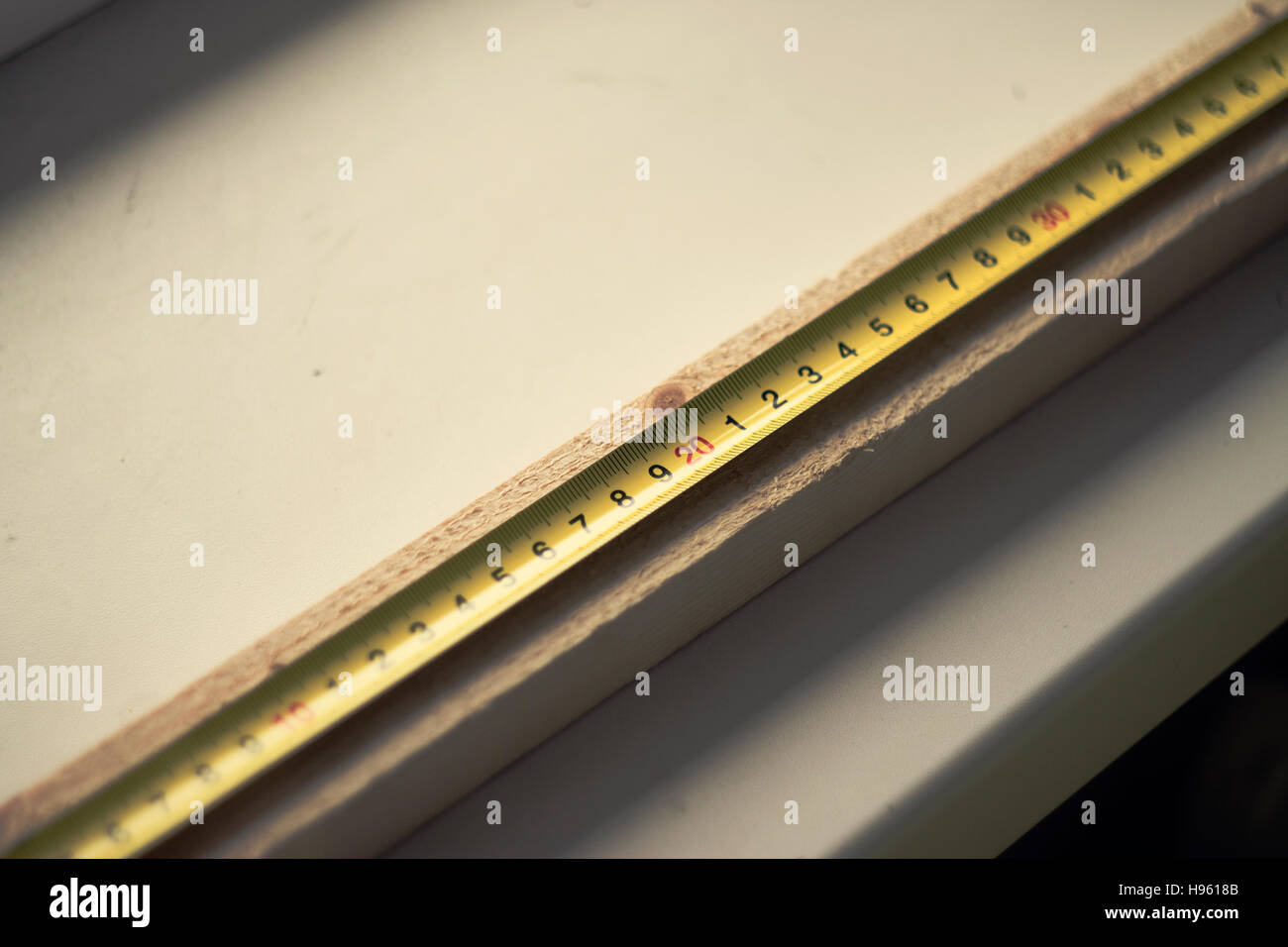 measuring tape measure small Board Stock Photo - Alamy