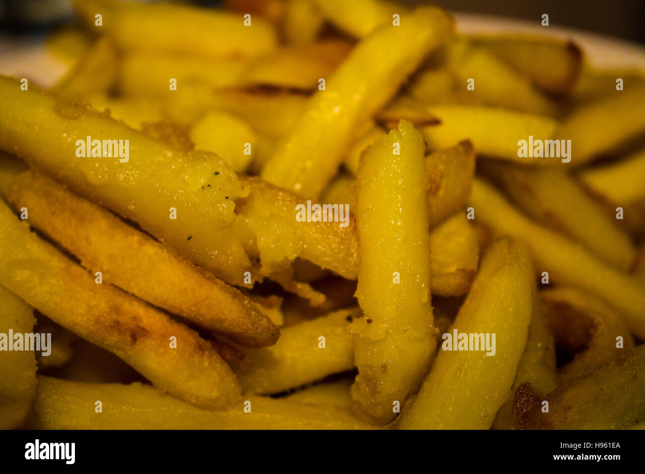 delicious fries in the middle view Stock Photo - Alamy