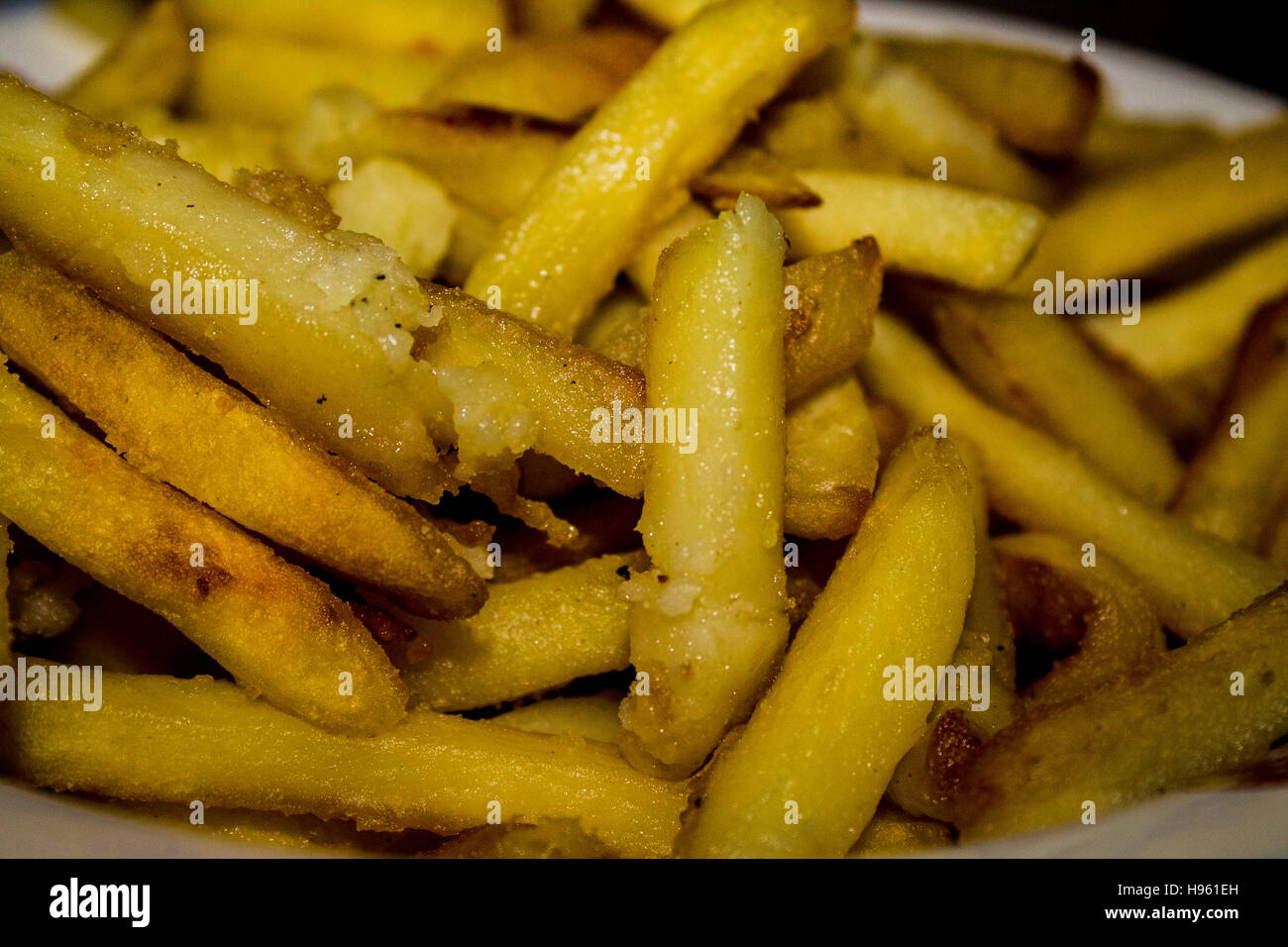 delicious fries in the middle view Stock Photo - Alamy