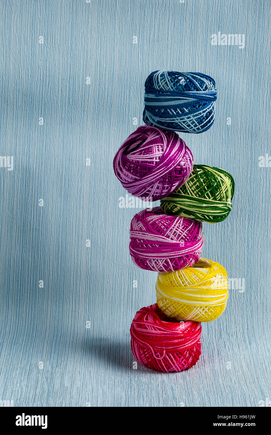 Awkwardly Balanced Rainbow Crochet Threads Stock Photo - Alamy