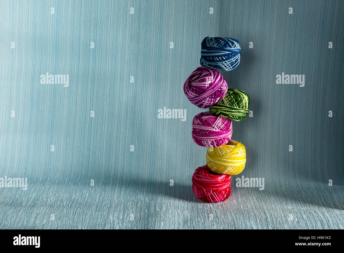 Awkwardly Balanced Rainbow Crochet Threads Stock Photo - Alamy