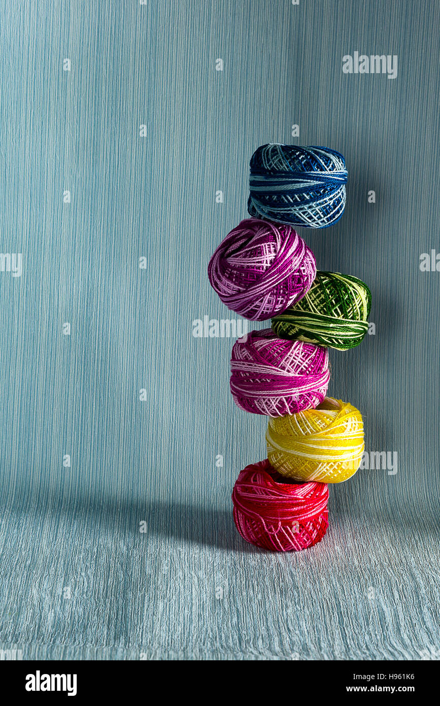 Awkwardly Balanced Rainbow Crochet Threads Stock Photo - Alamy