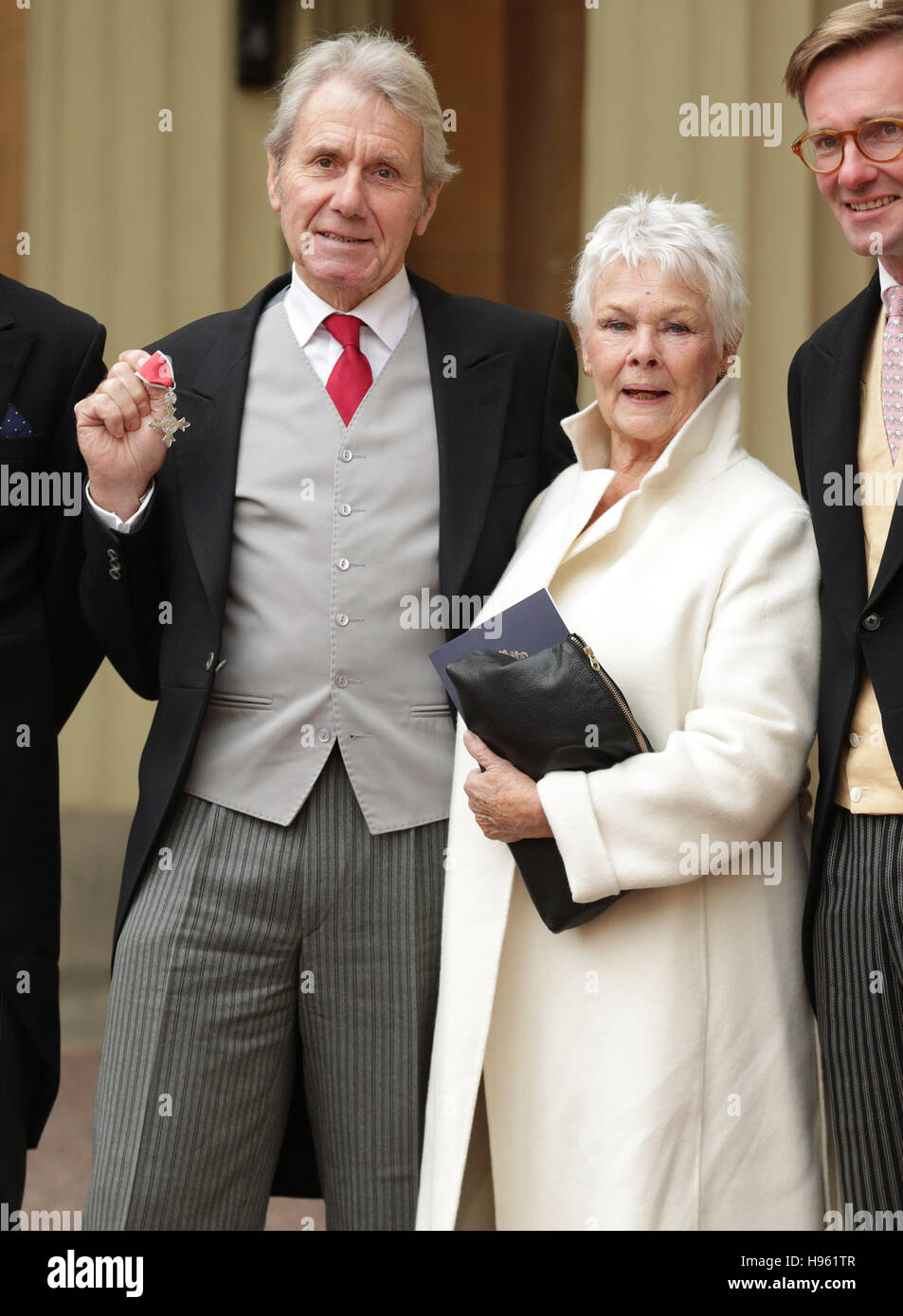 Dame Judi Dench with David Mills with his MBE which he received by the ...