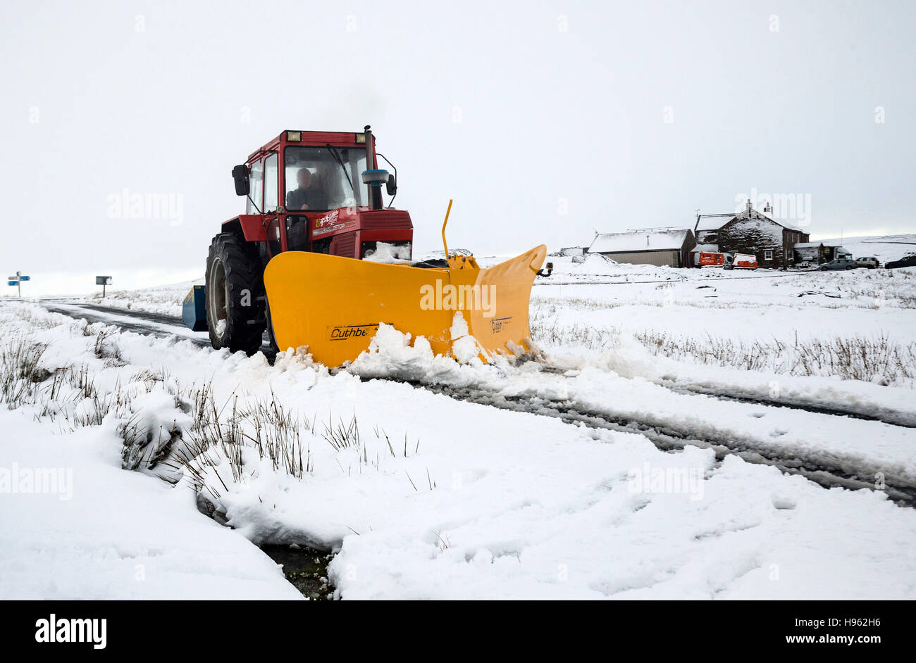 A snow plough on Tan Hill in the Yorkshire Dales National Park after ...