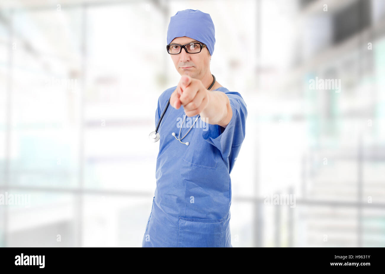 male doctor pointing at the hospital Stock Photo - Alamy