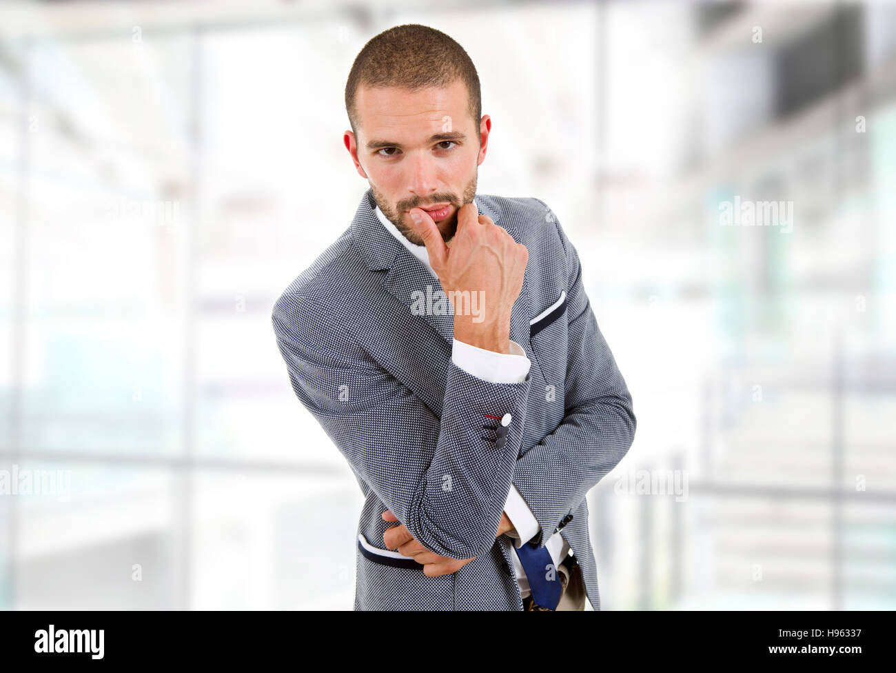 young business man thinking, at the office Stock Photo - Alamy