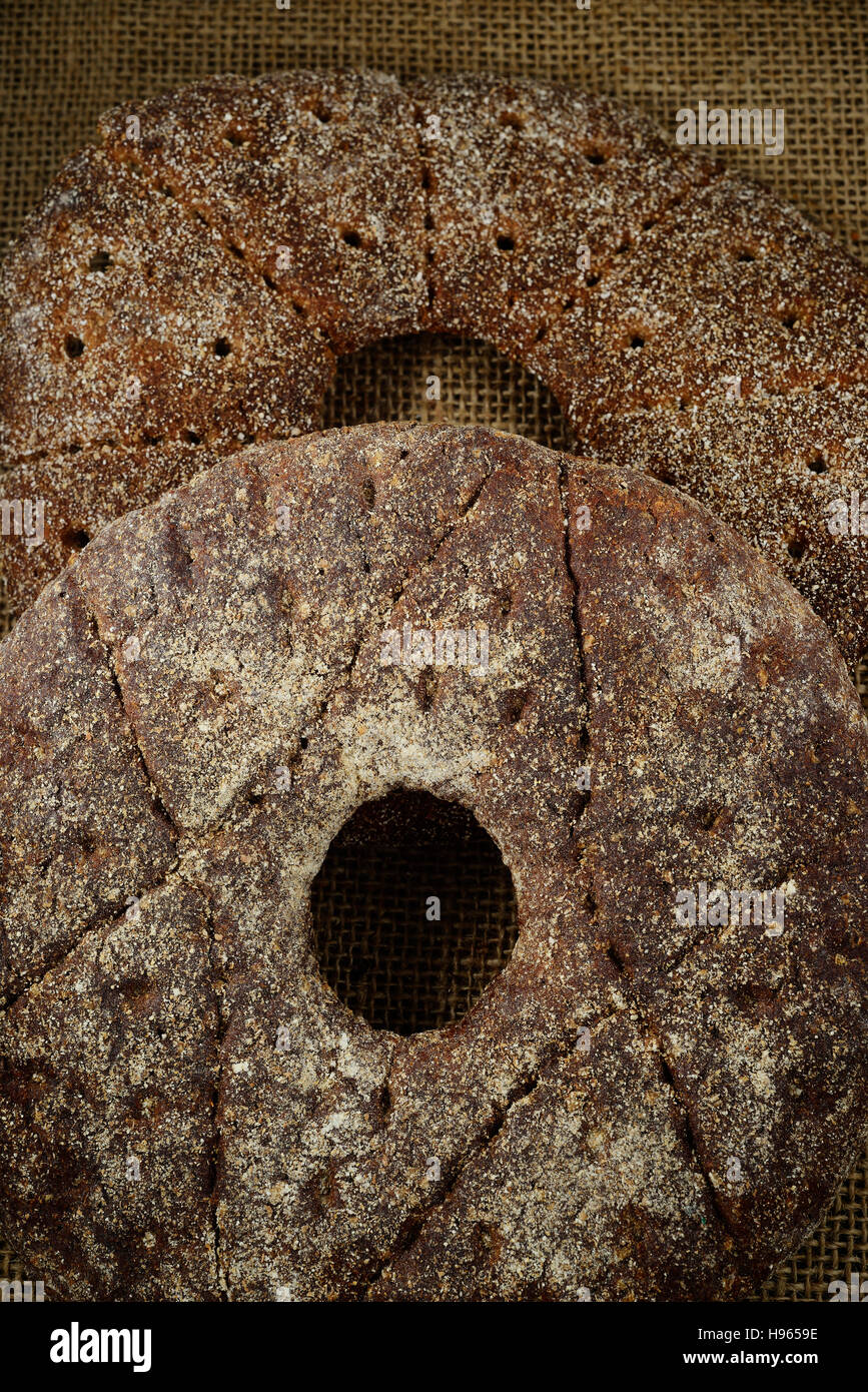 two finnish traditional round ray bread on a sackcloth Stock Photo - Alamy