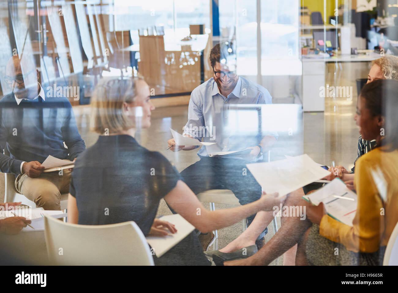 Business people reviewing paperwork hi-res stock photography and images ...