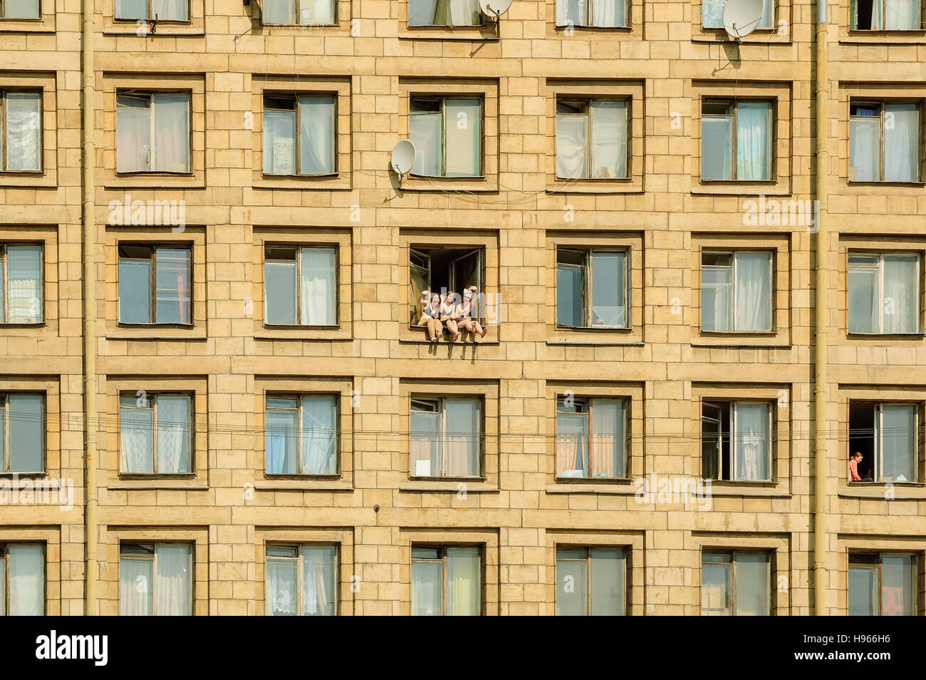 Girls in house window hi-res stock photography and images - Alamy