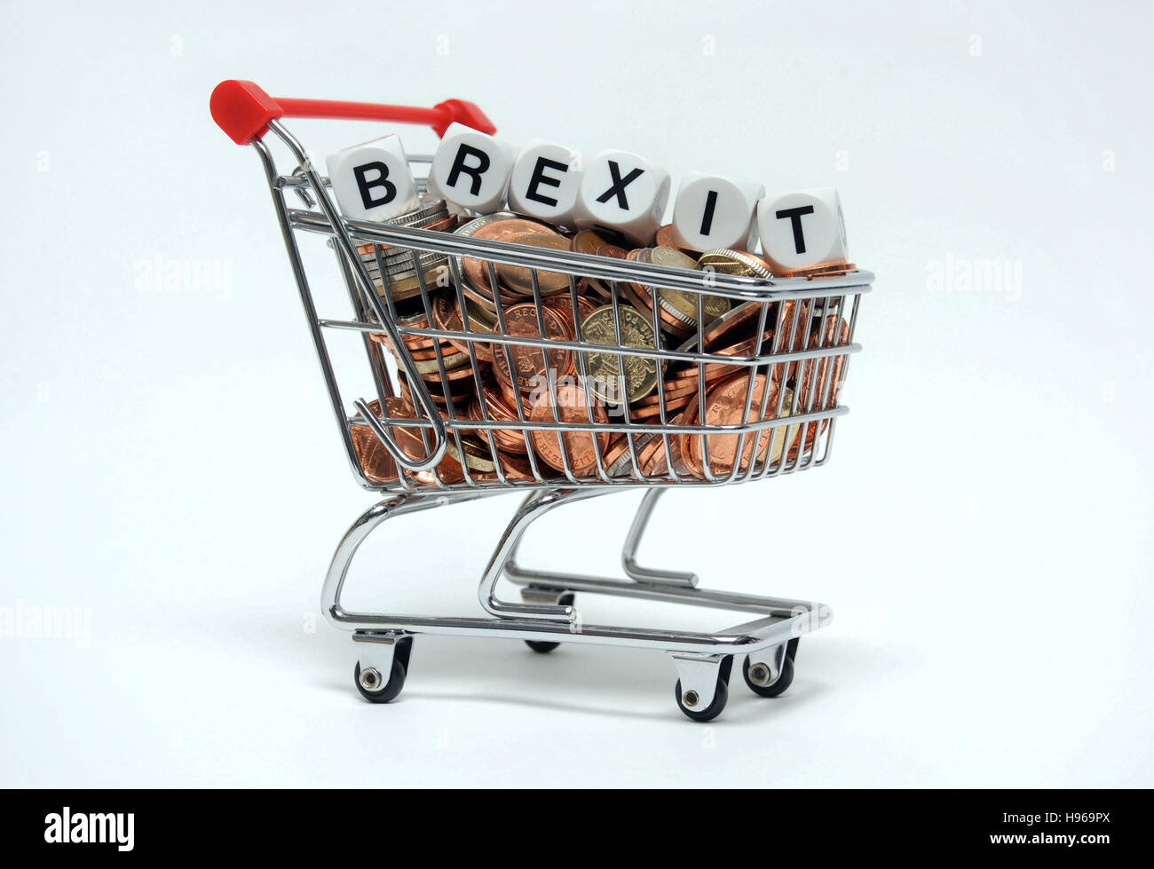 SHOPPING TROLLEY FULL OF BRITISH MONEY WITH WORD DICE SPELLING "BREXIT ...