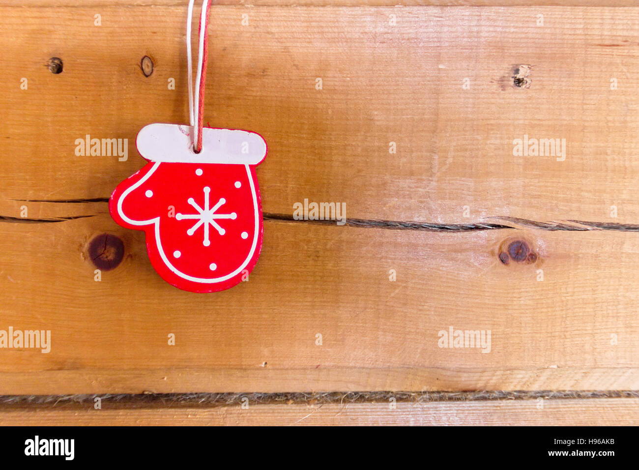 Christmas wooden ornaments toy mitten with ribbon hanging Stock Photo ...