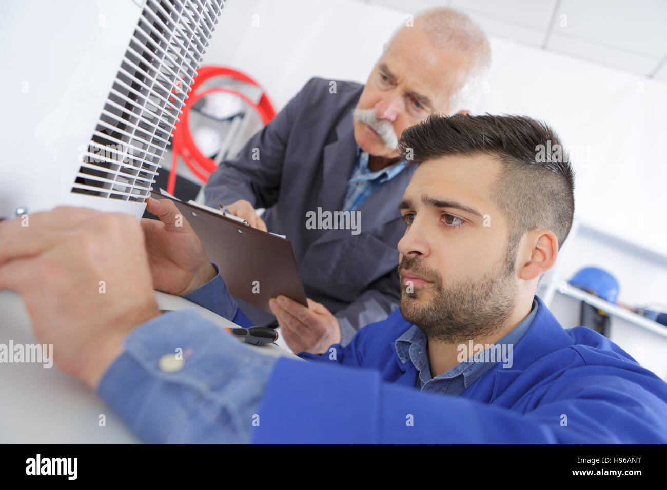 portrait of a worker and his manager Stock Photo - Alamy