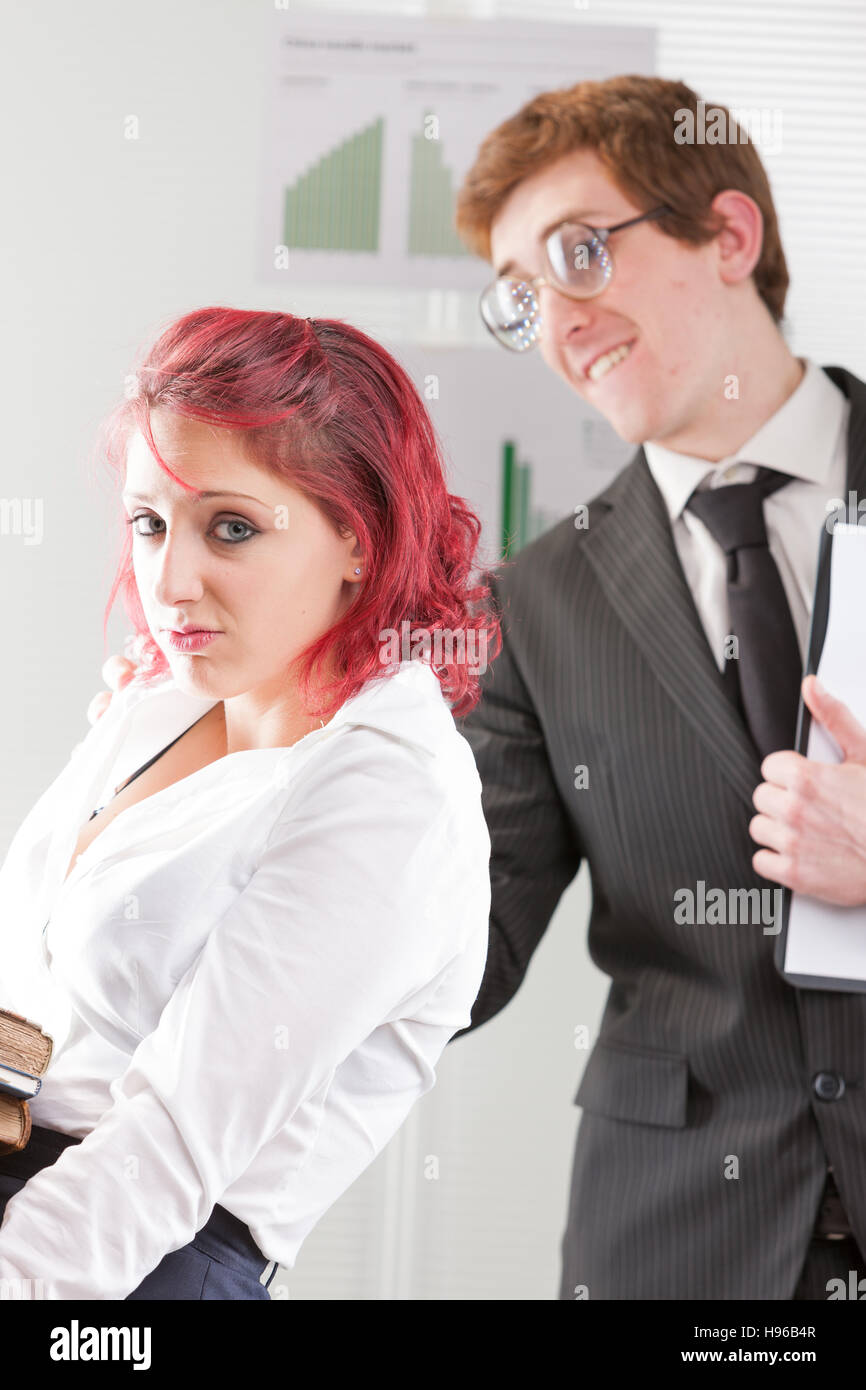 Woman pestering man in office hi-res stock photography and images - Alamy
