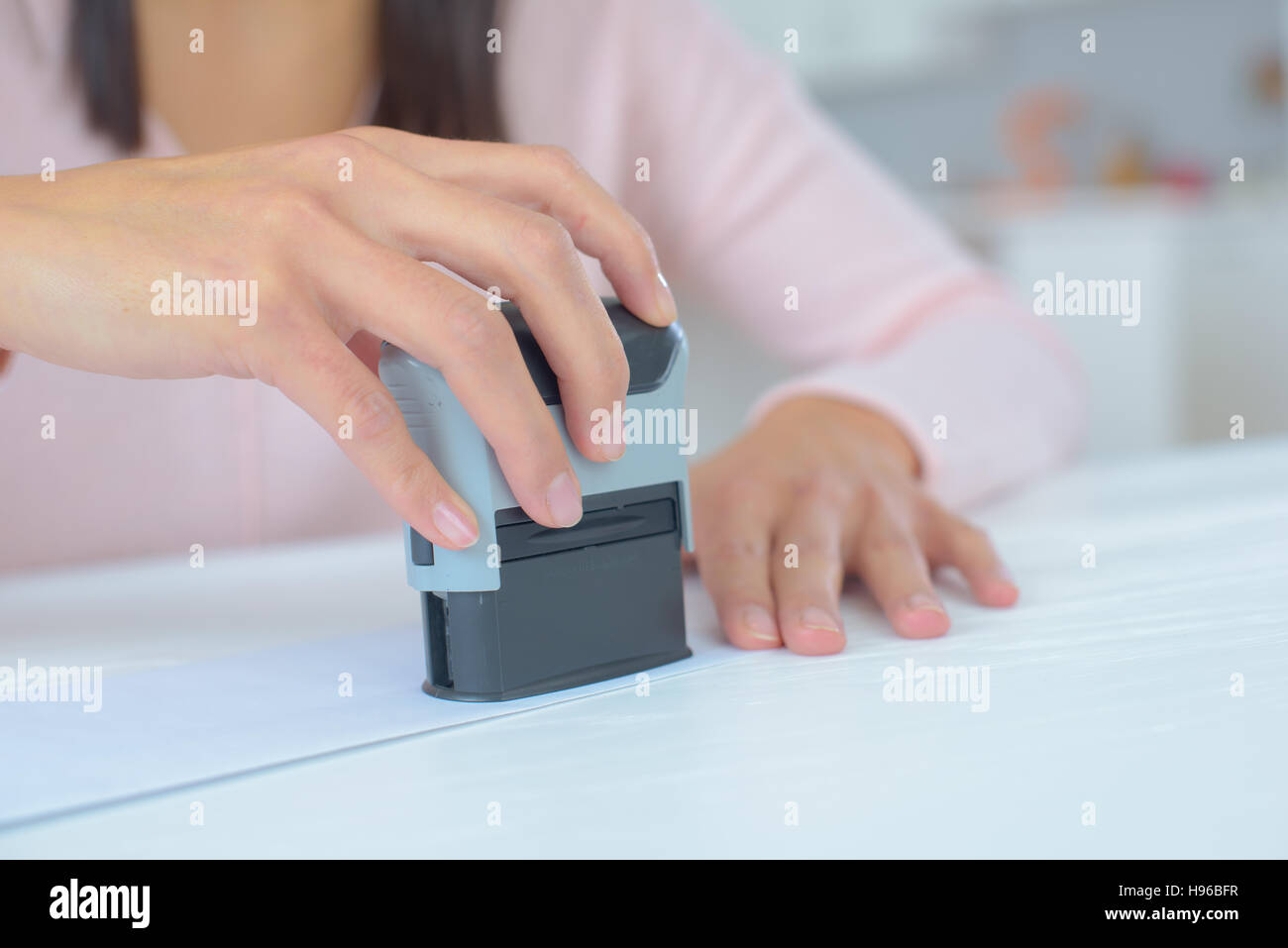 woman stamping a legal document Stock Photo - Alamy