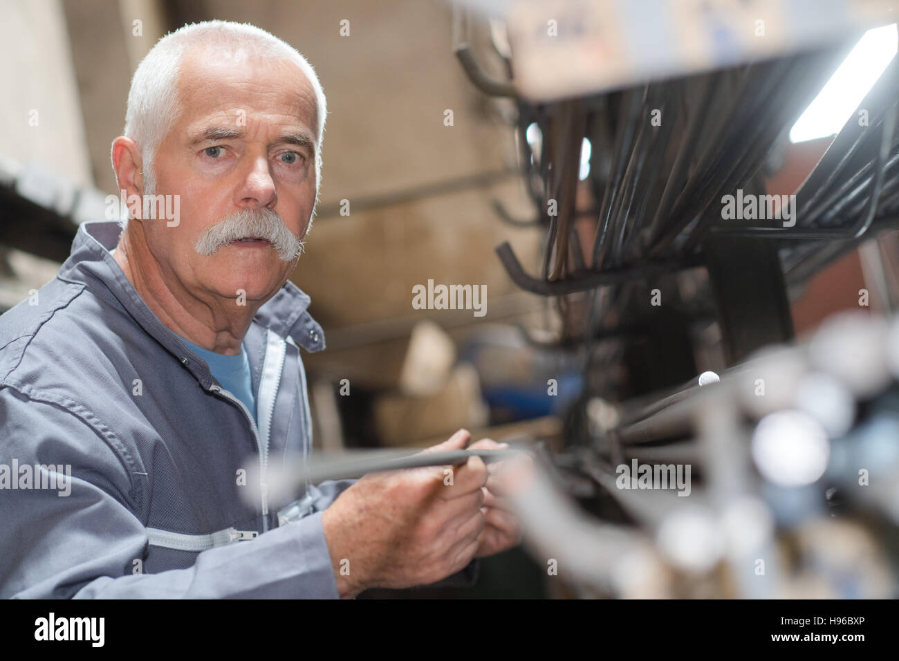 portrait of senior metallurgy worker Stock Photo - Alamy
