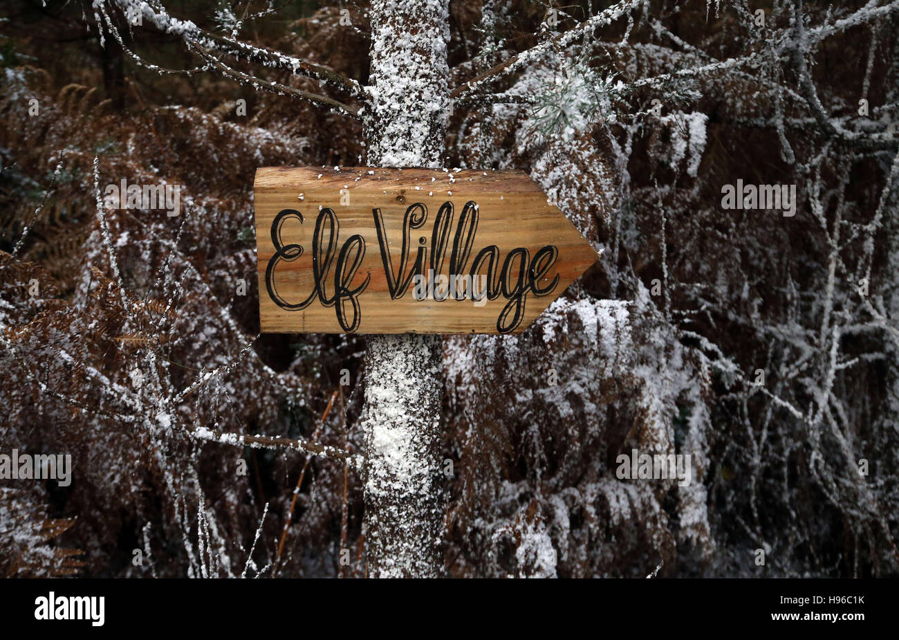 A snow covered sign during the opening day of LaplandUK, a village with ...