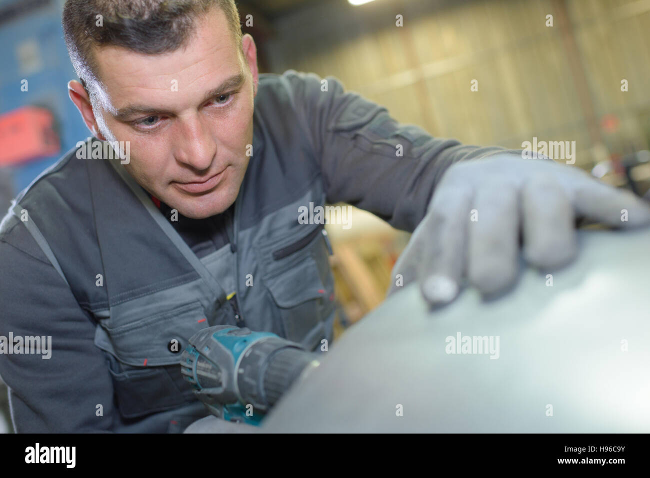 workman on the job Stock Photo - Alamy