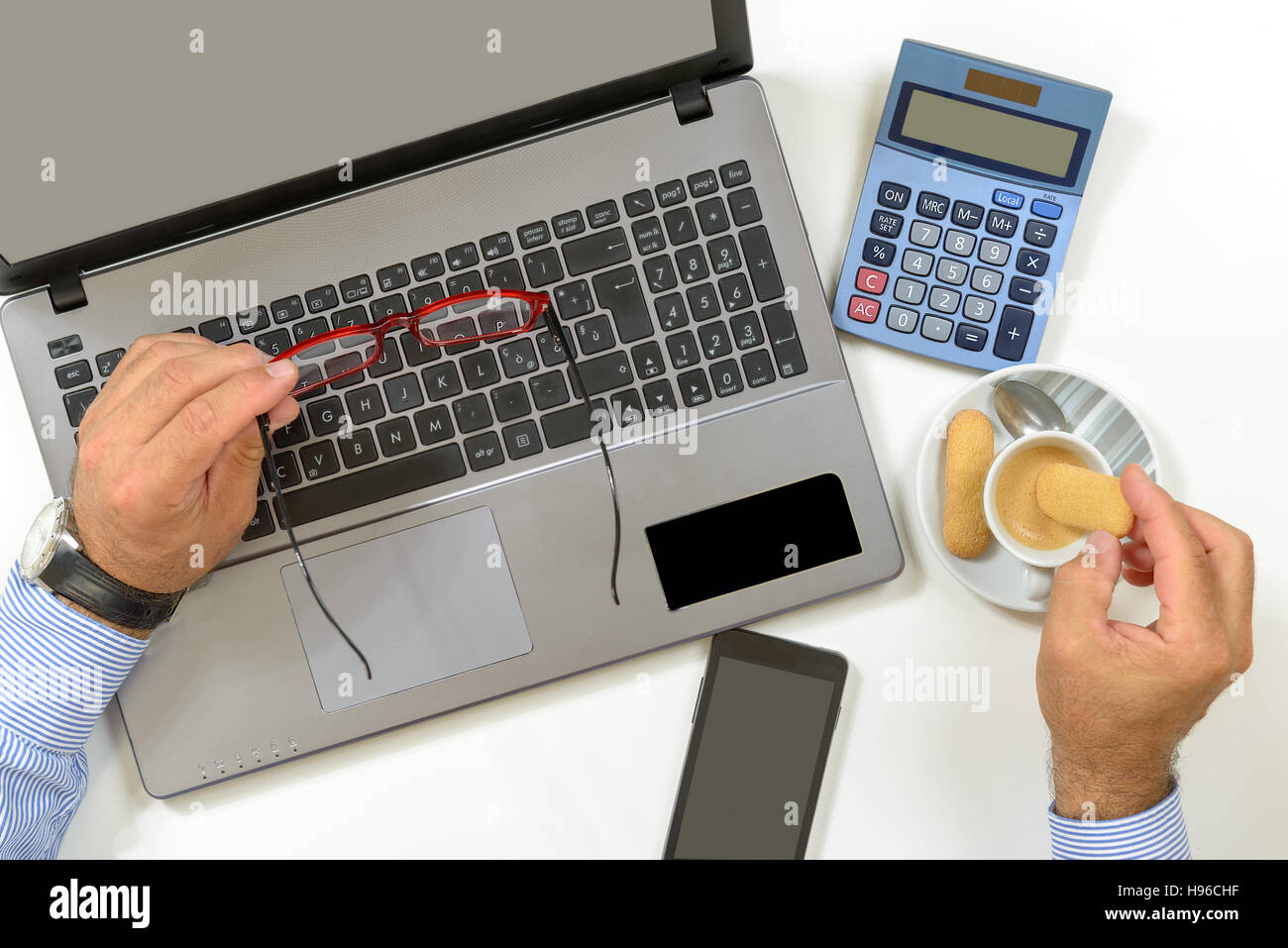 Businessman in office desk using computer. Coffee Break. View from ...