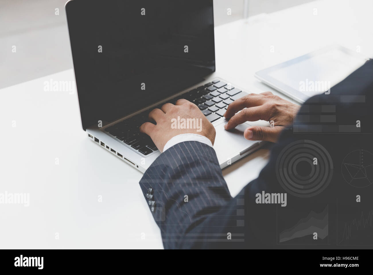 businessman typing on laptop computer in office workplace Stock Photo ...