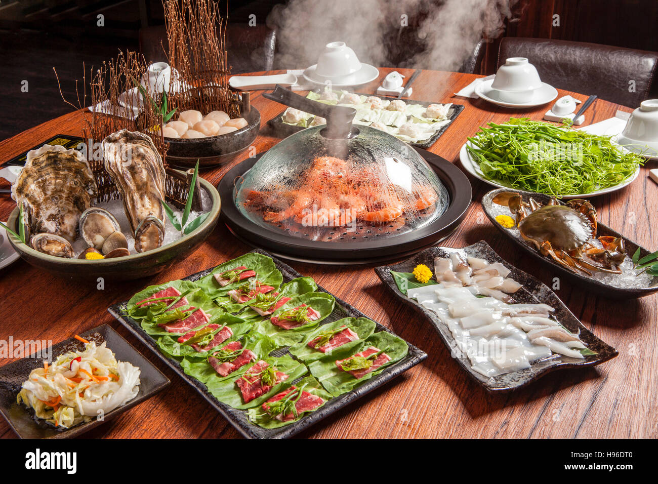 full set of Seafood steam pot / hot pot Stock Photo - Alamy