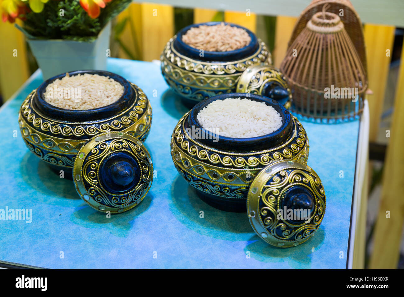 uncooked dry rice in thailand traditional bowl Stock Photo - Alamy