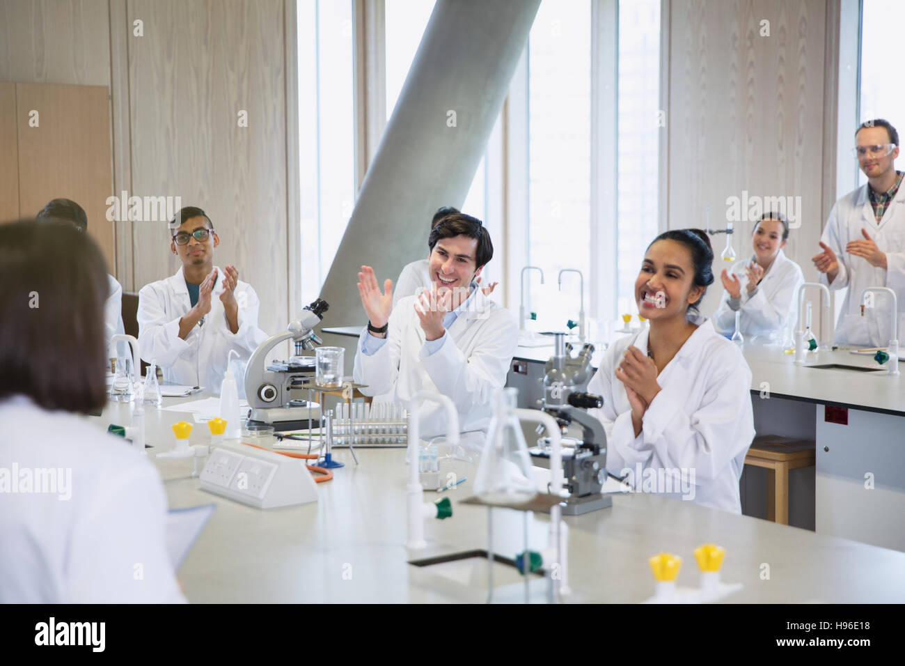 Students clapping in classroom hi-res stock photography and images - Alamy