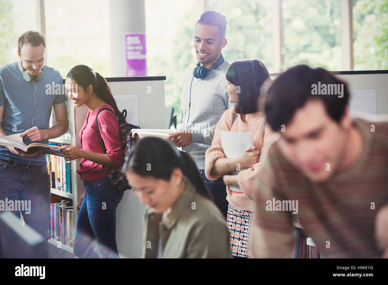College students studying in library Stock Photo - Alamy