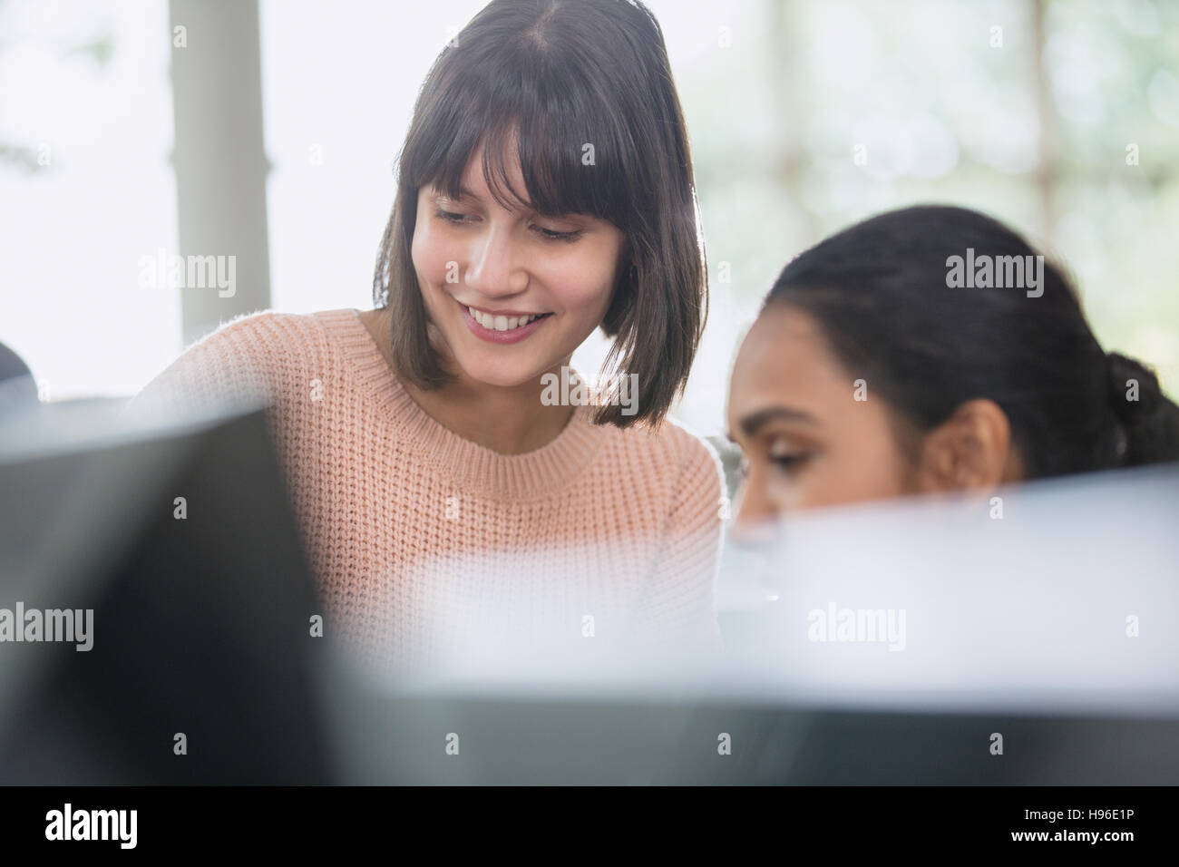 Female college students using computer Stock Photo - Alamy