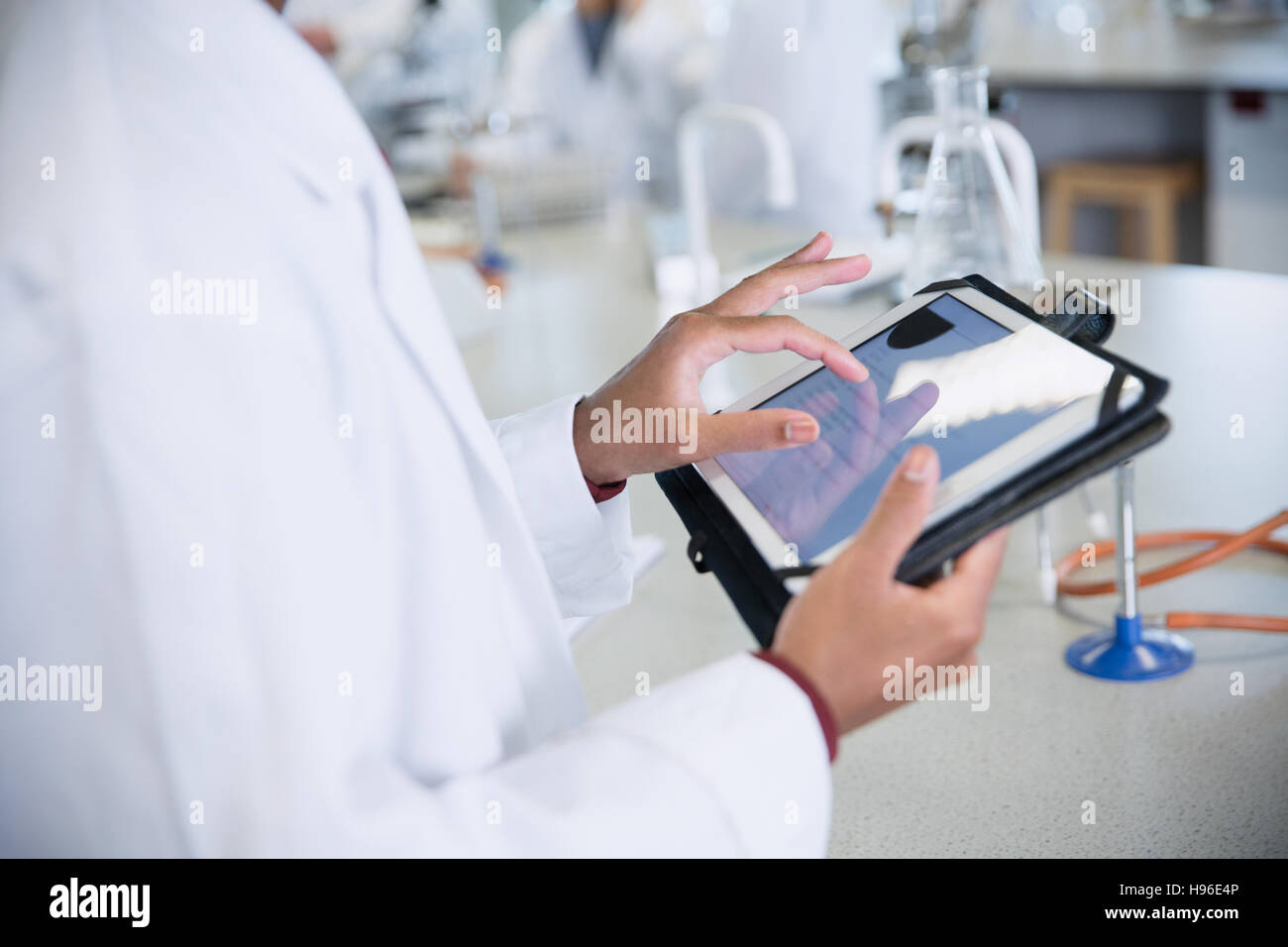 Scientist using touch screen in hi-res stock photography and images - Alamy