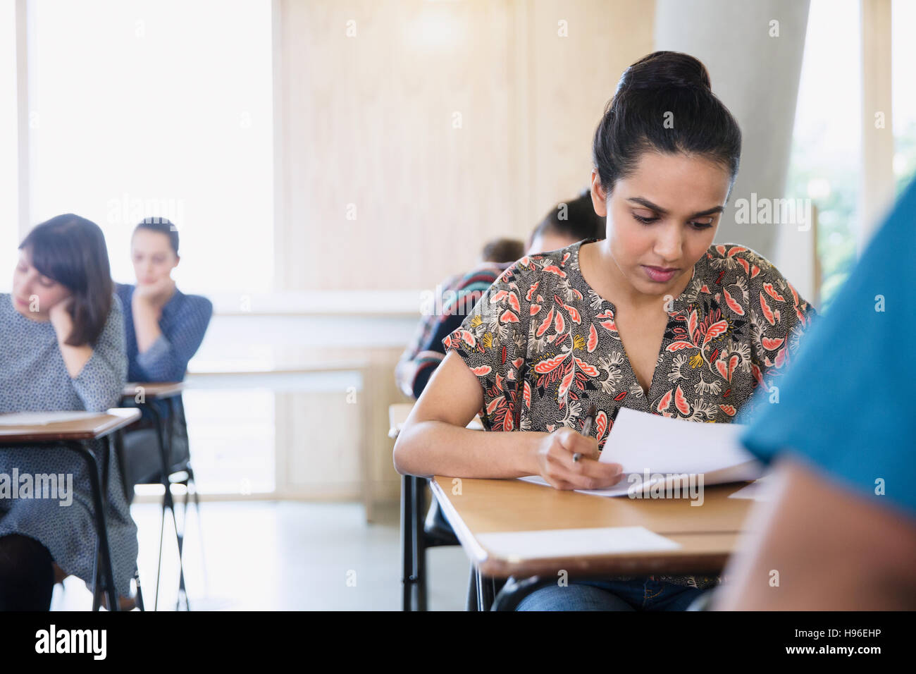 Student taking exam desk hi-res stock photography and images - Alamy