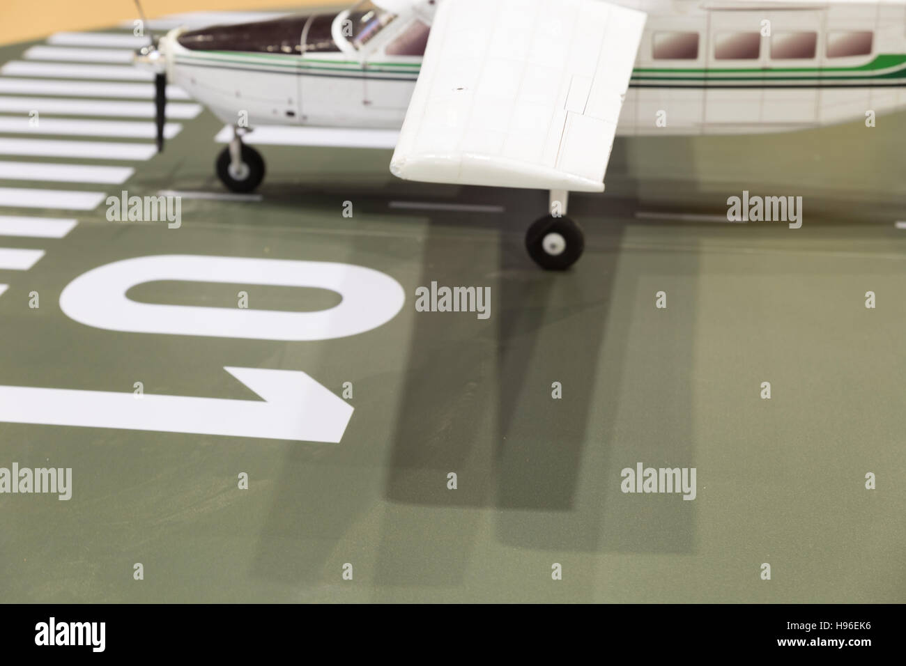 white airplane aircraft aeroplane metal miniature model Stock Photo - Alamy