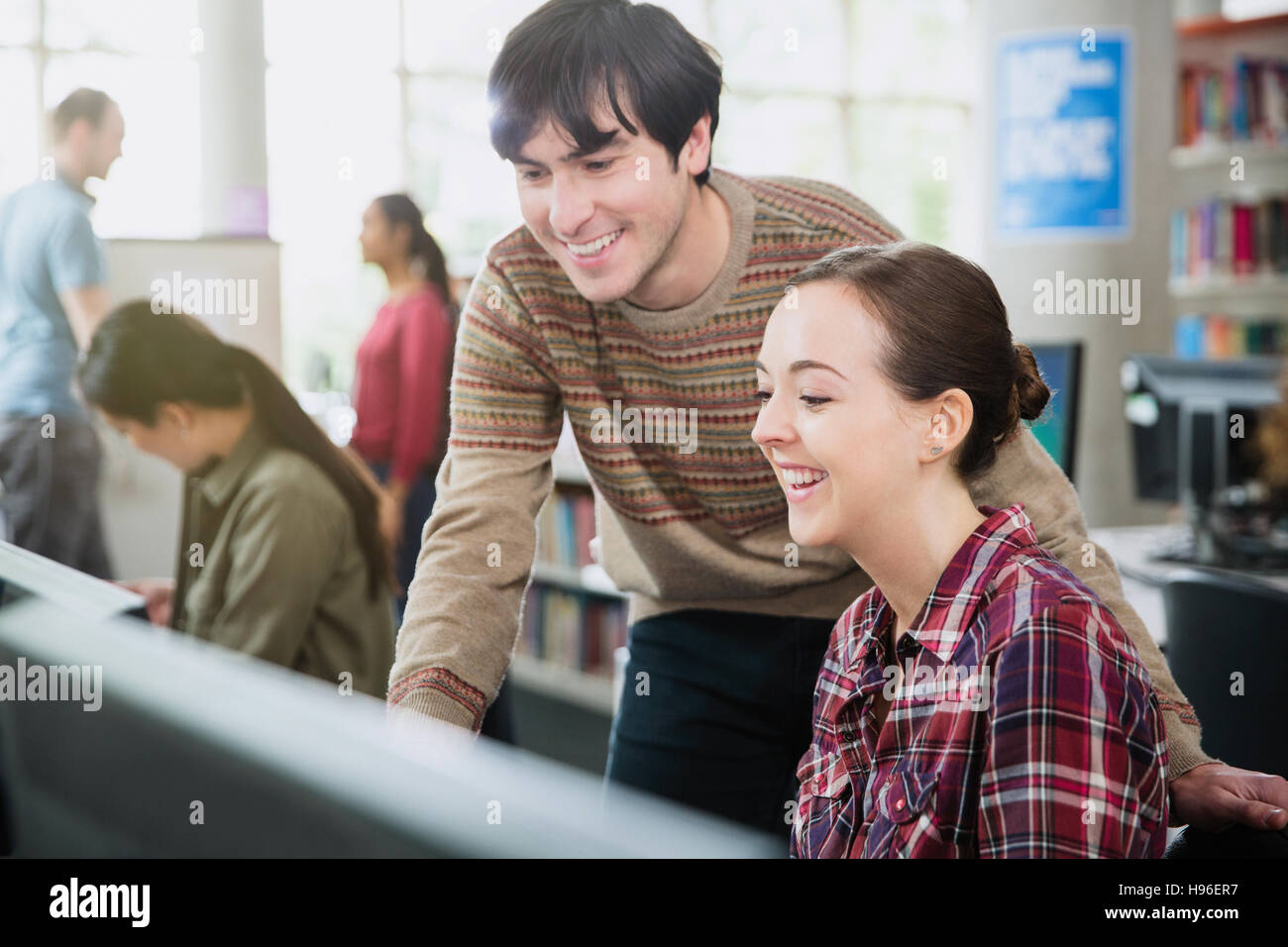 College students using computer in computer lab classroom Stock Photo ...