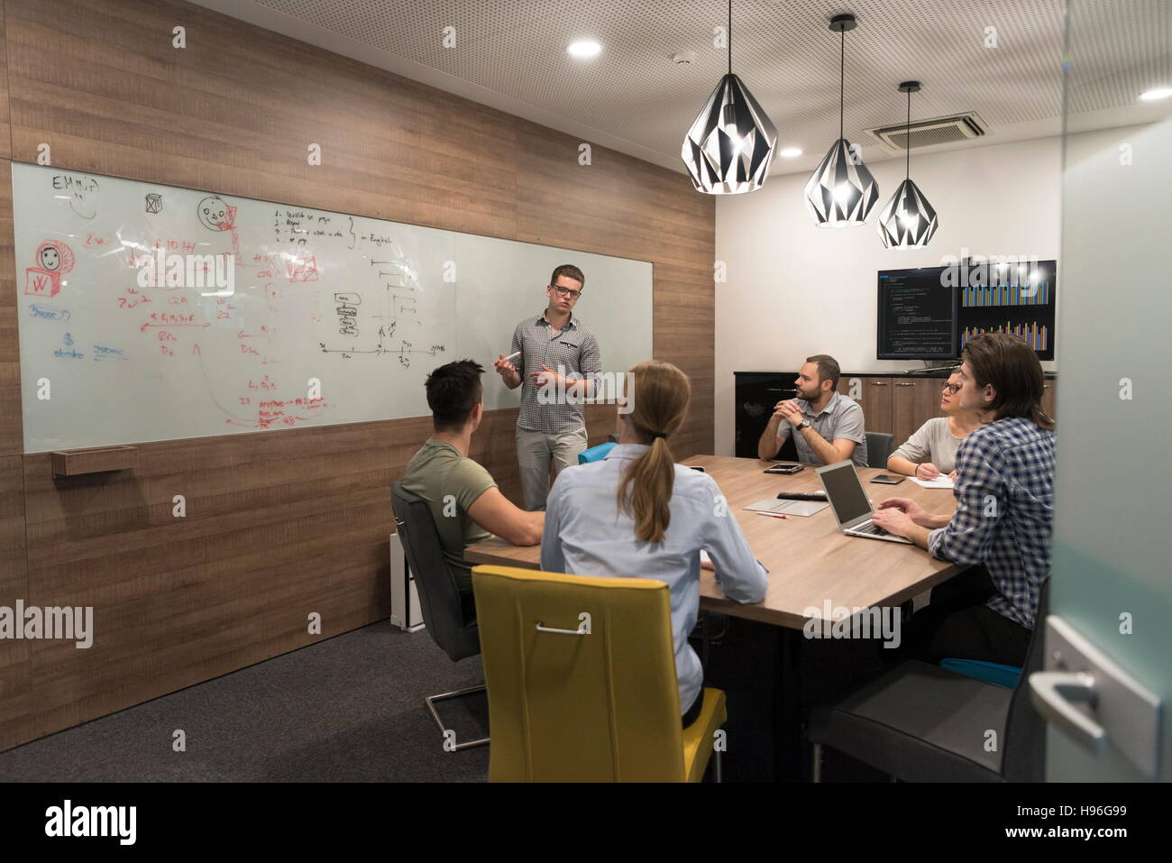 startup business team brainstorming on meeting working on laptop and ...