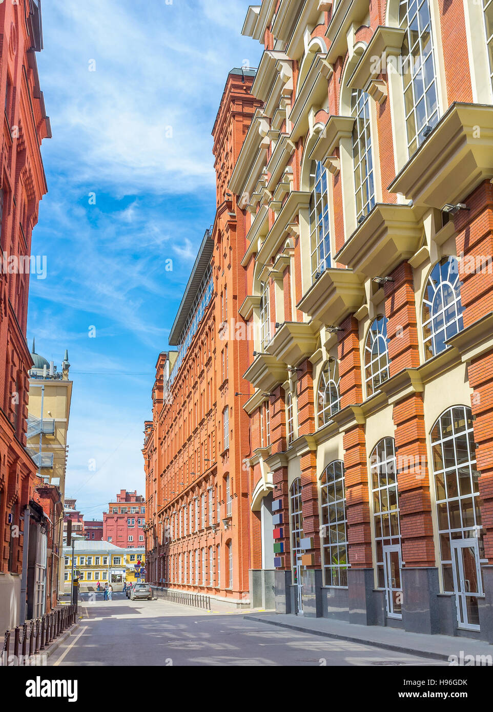 The high red buildings of Golutvinskiy lane that leads to the ...