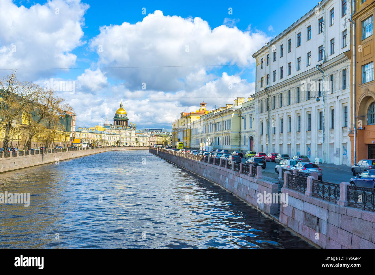 The stone embankments of Moyka River with the scenic mansions and the ...