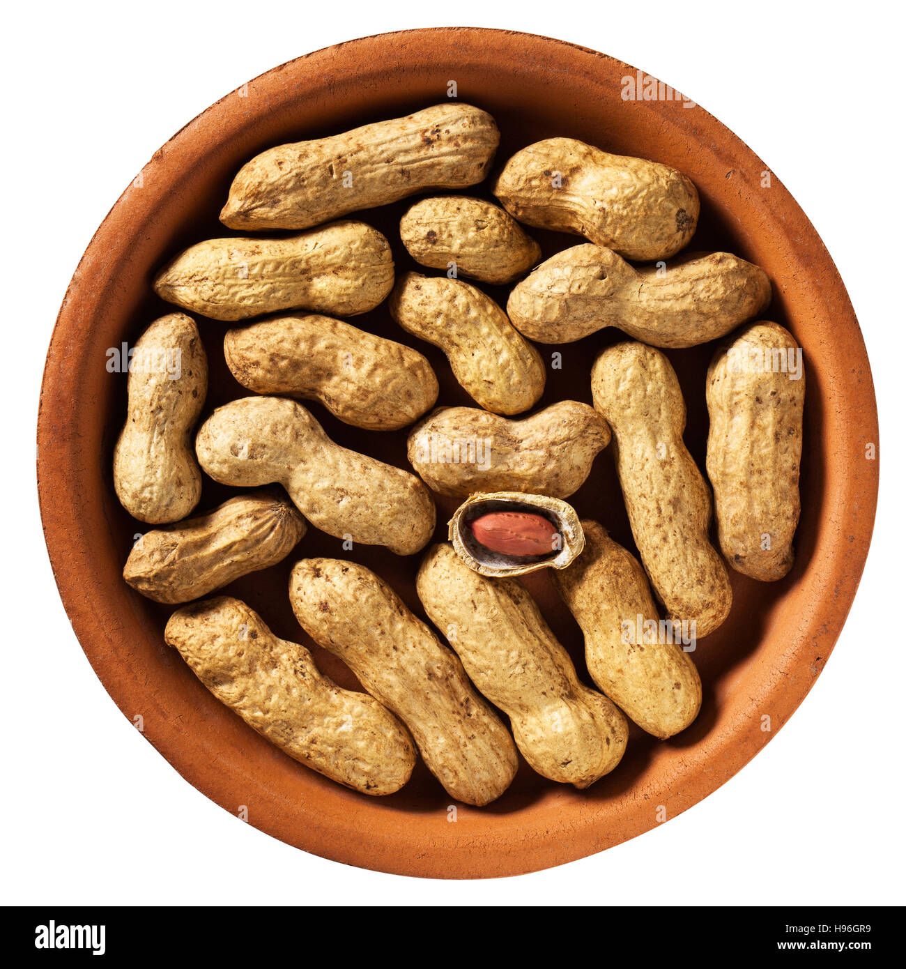 Peanuts in the shell on a saucer isolated on white Stock Photo - Alamy