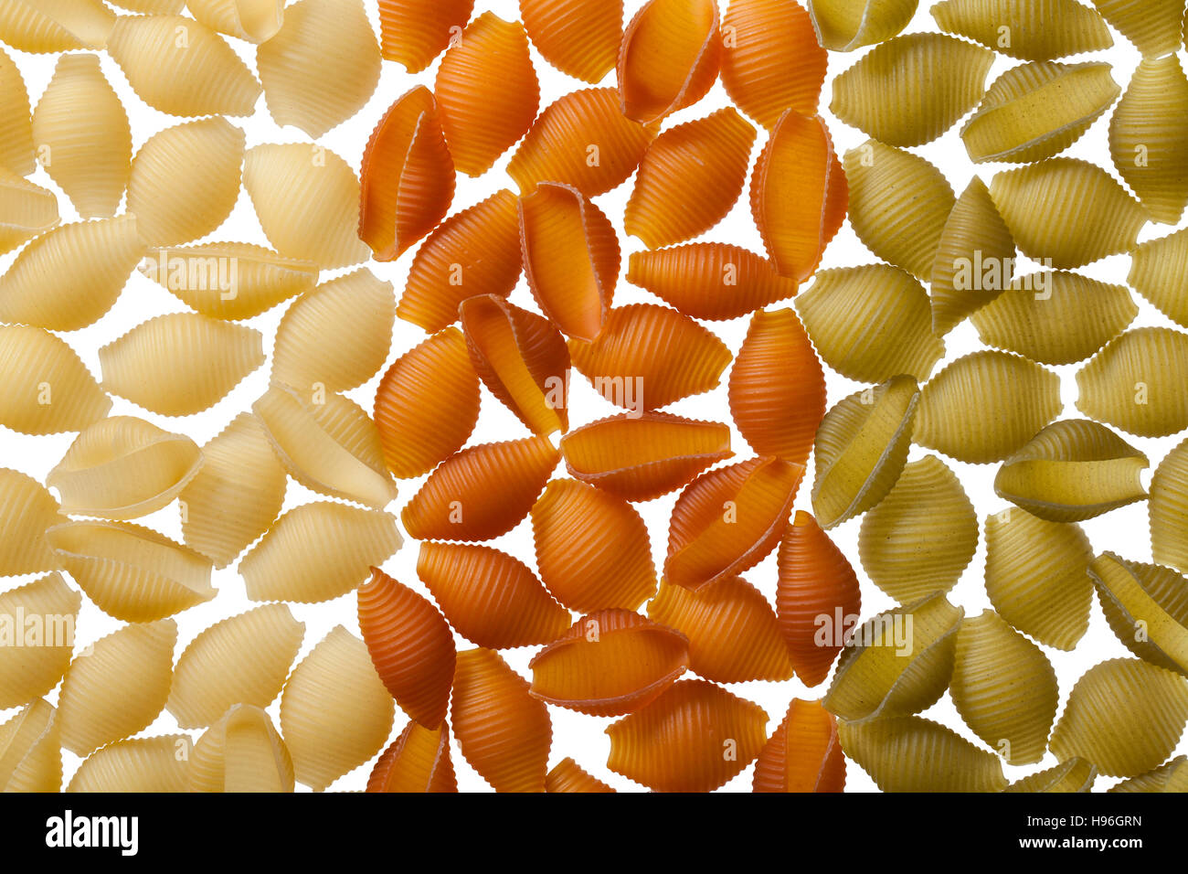 Shell pasta background isolated on white Stock Photo - Alamy