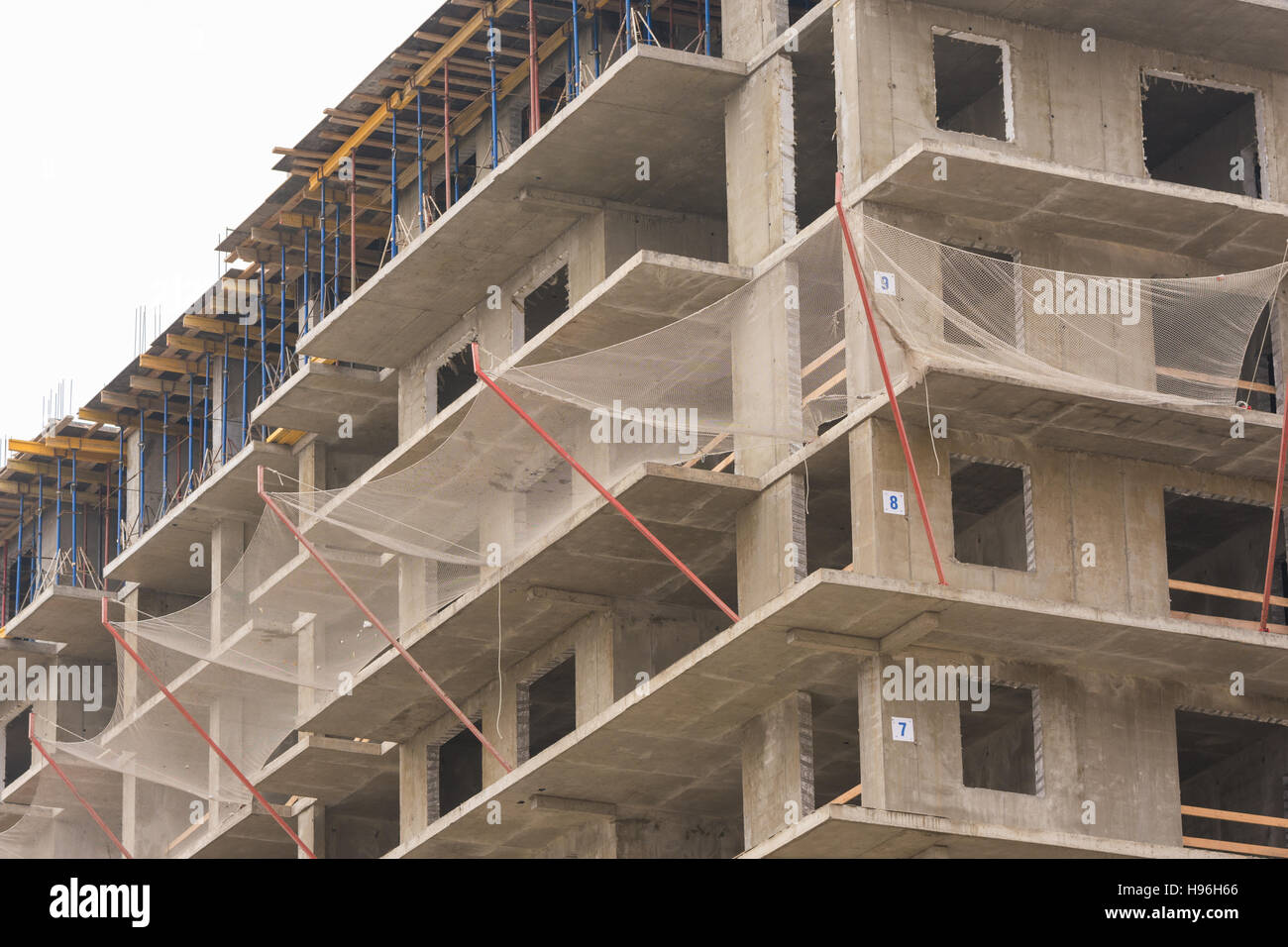 Protective guard from falling objects during the construction of multi ...