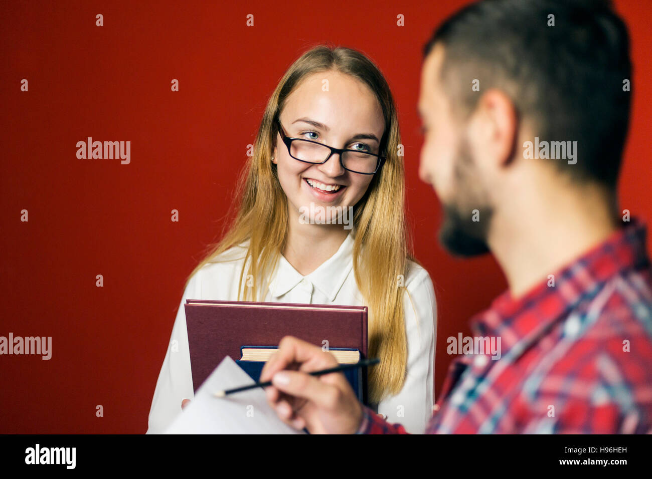 Two Students Have a Friendly Discussion Stock Photo - Alamy