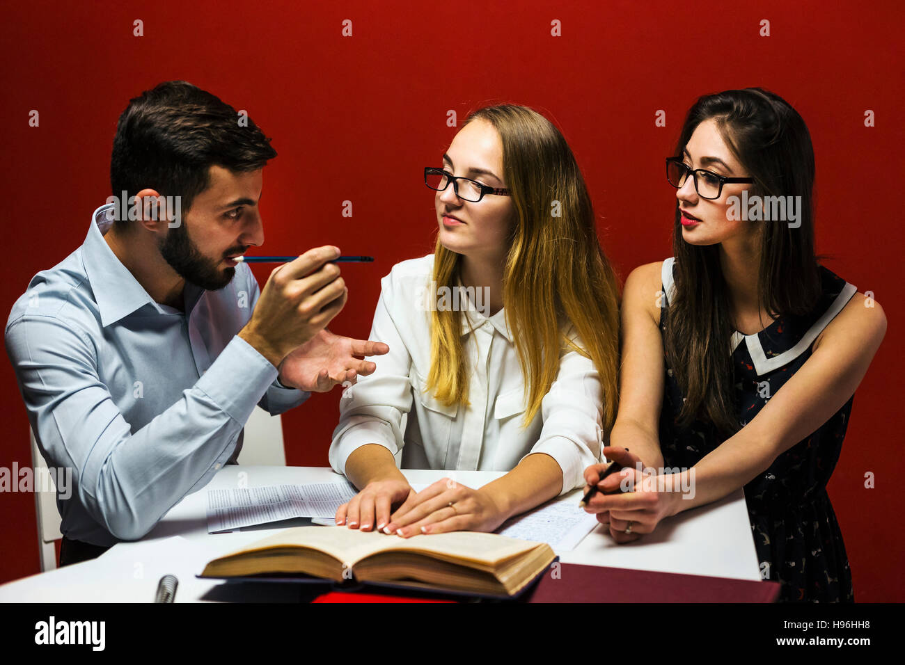 Group of Students Have a Friendly Study Discussion Stock Photo - Alamy