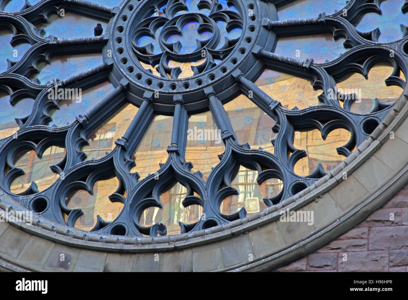 decorative church tower window in Montreal Canada with reflection of ...