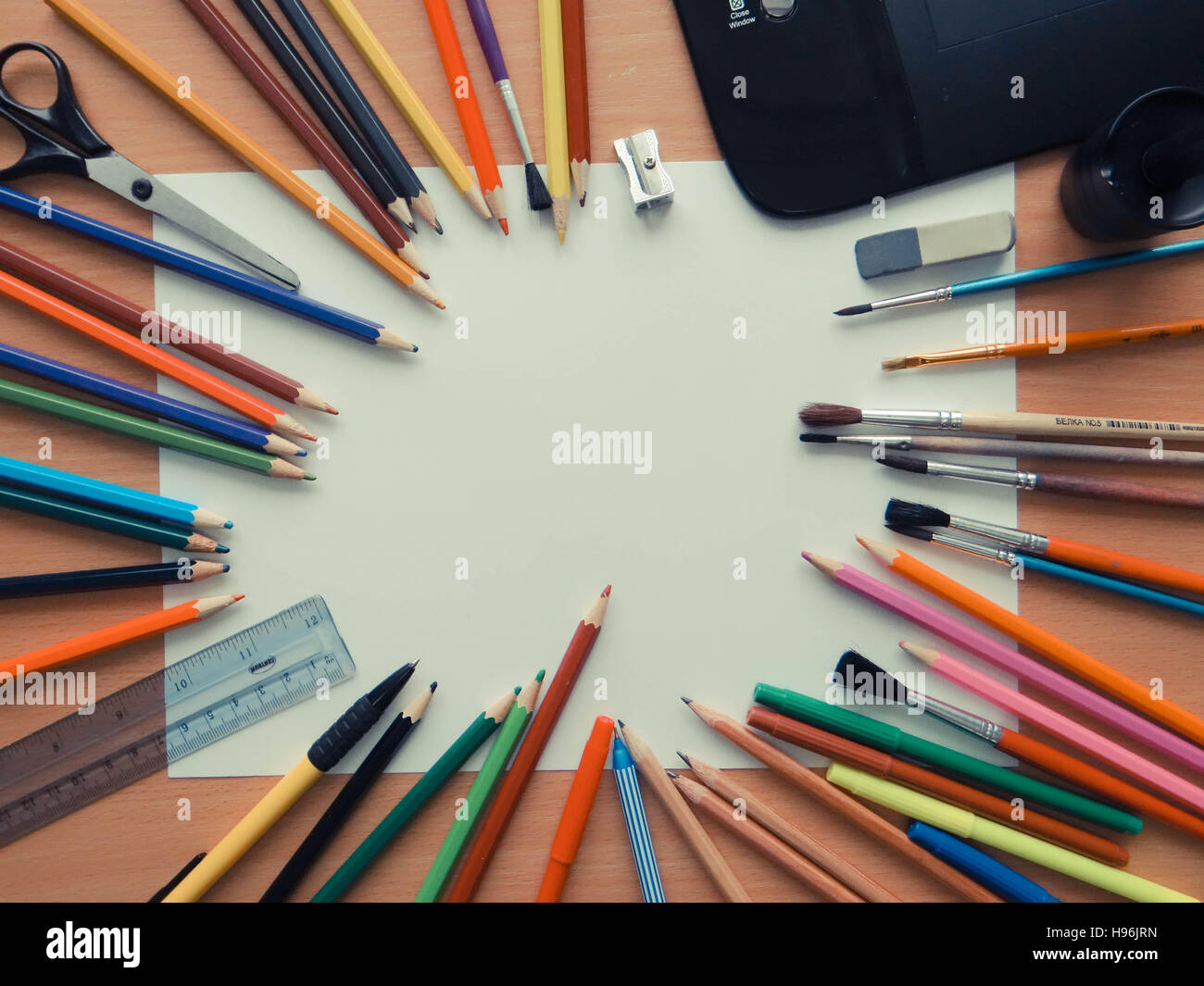 Assortment of various school items on wooden background Stock Photo - Alamy