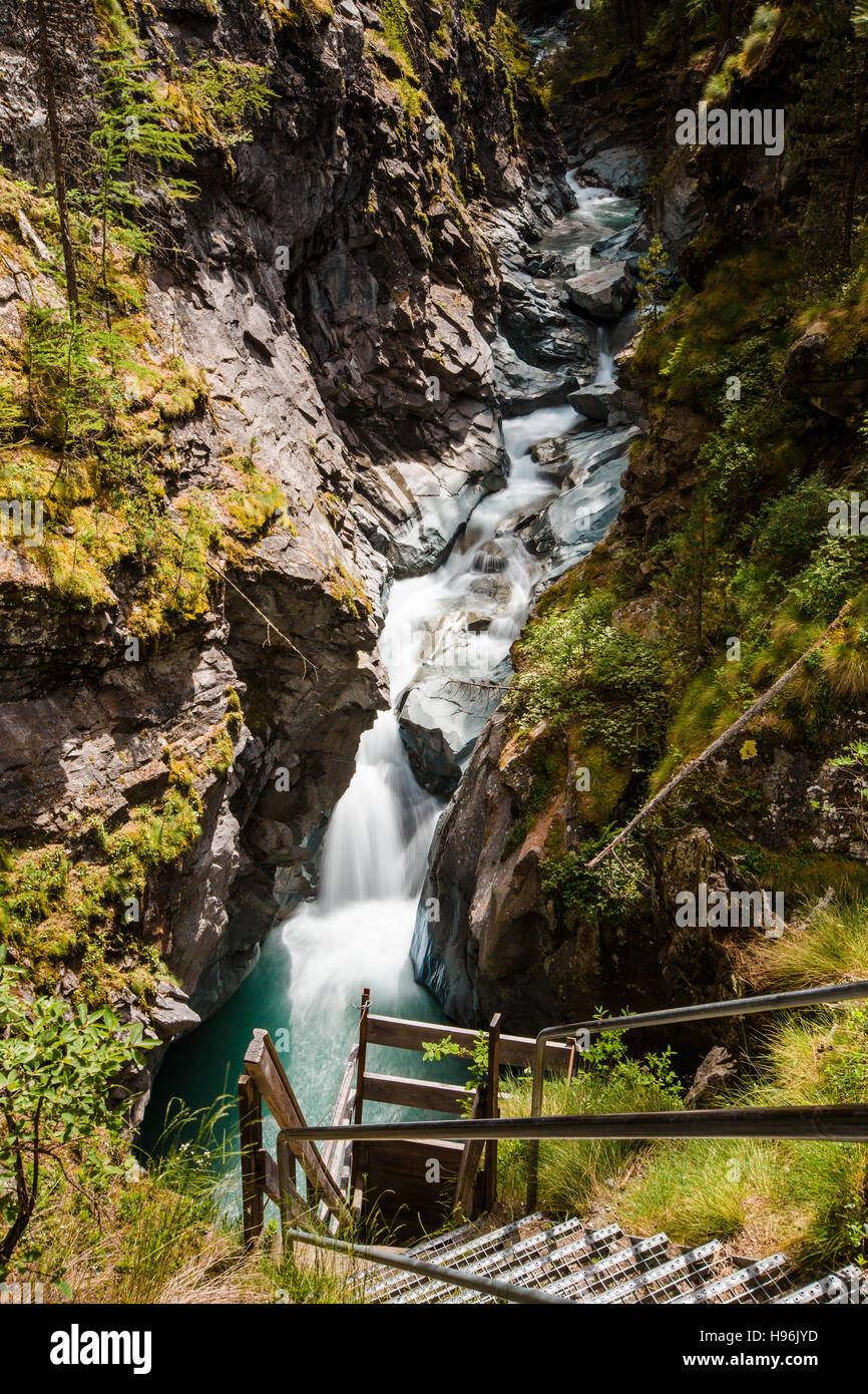 Gorner Gorge with tourist path and river below Stock Photo - Alamy